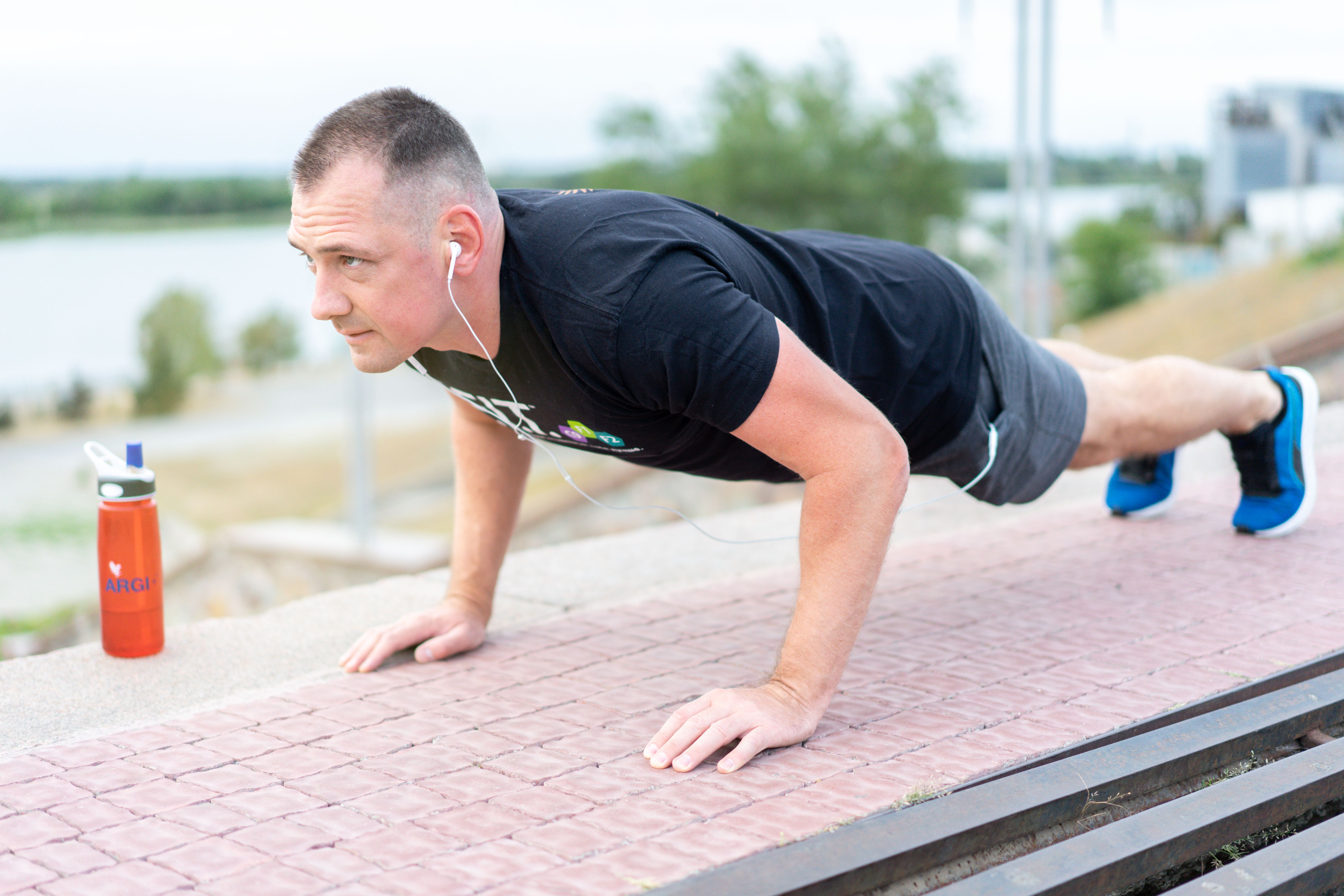 Man Push-up on White Floor · Free Stock Photo