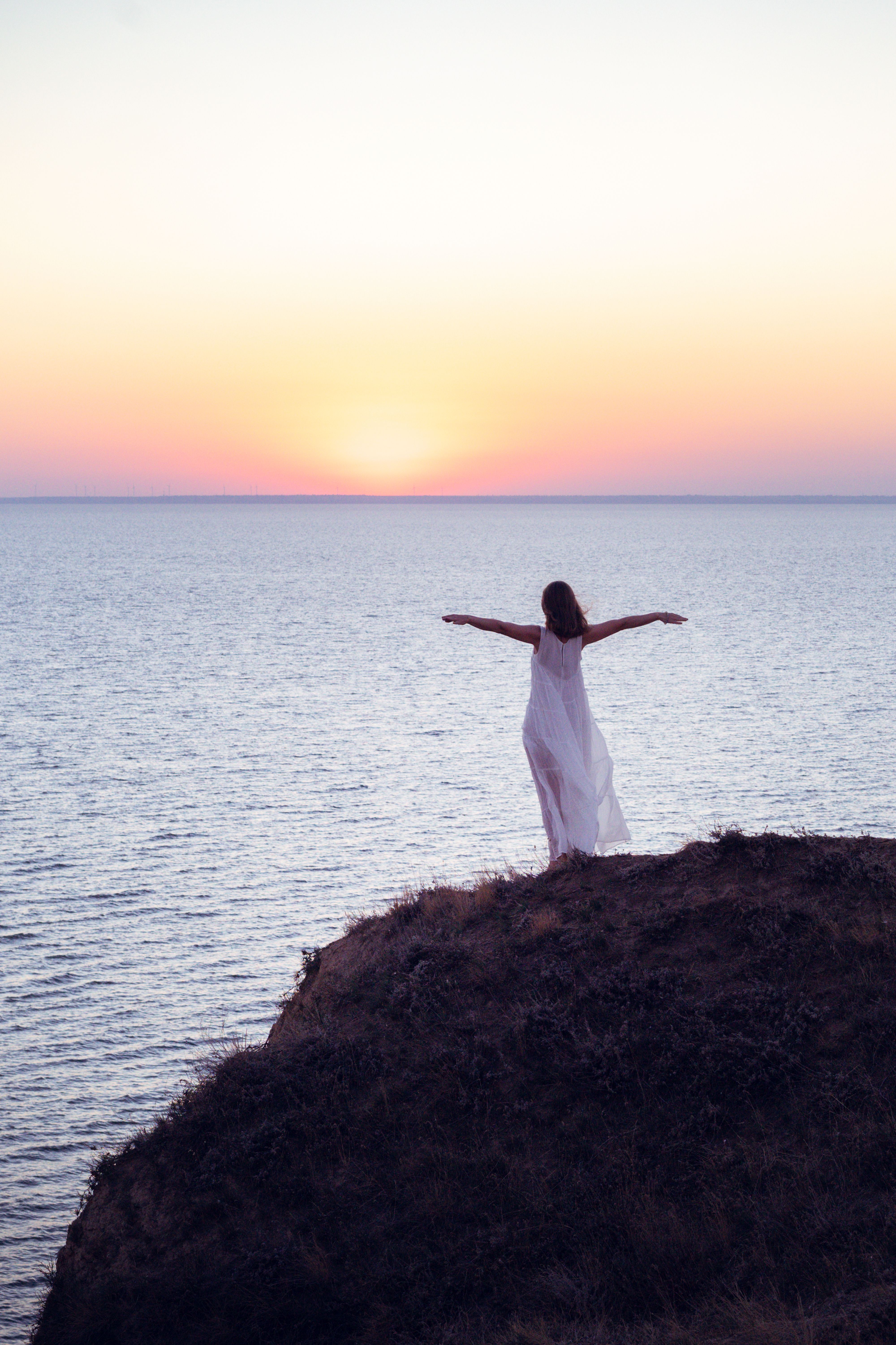 Back View of a Woman with Her Arms Apart · Free Stock Photo