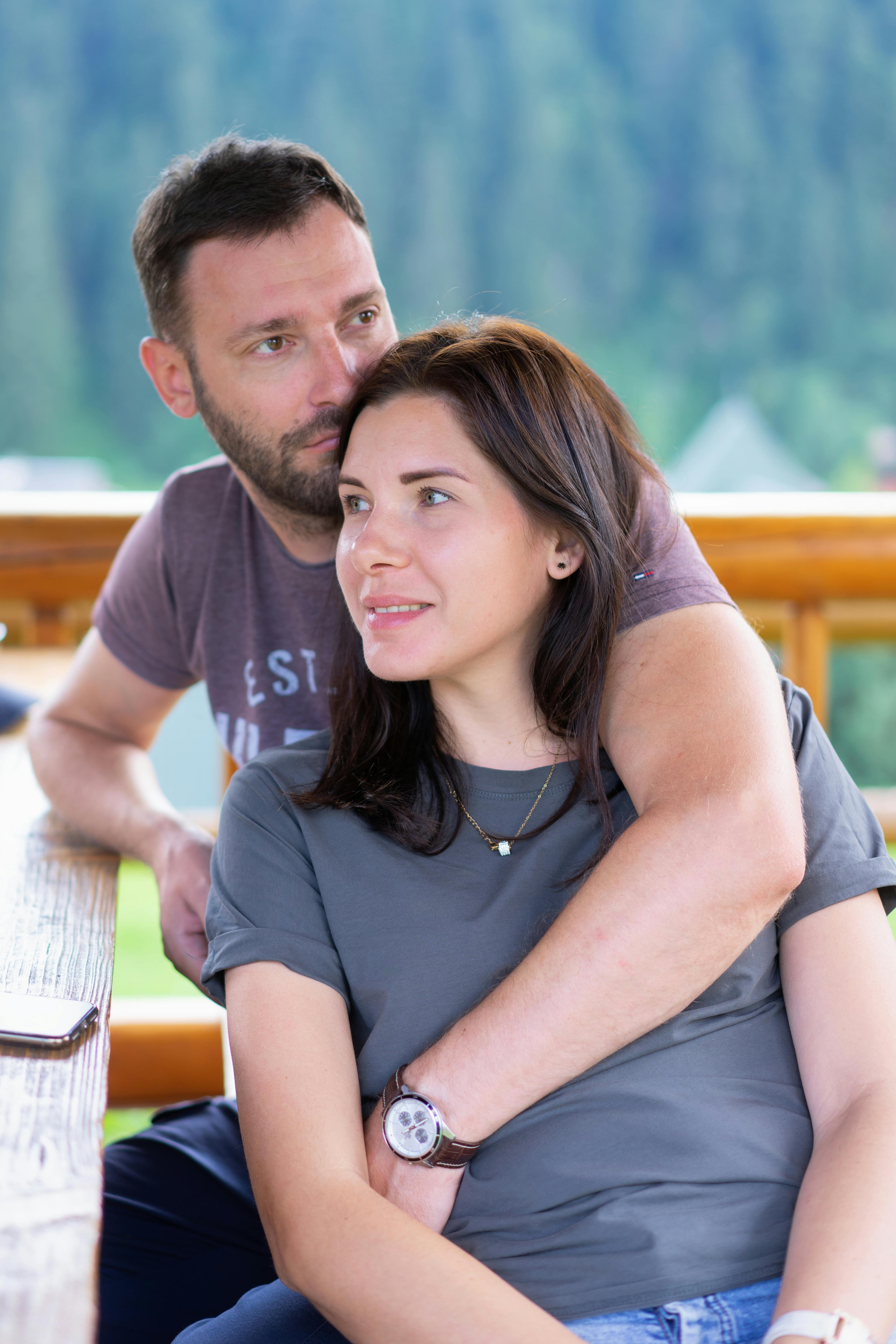 Romantic Couple Sitting on Sofa · Free Stock Photo