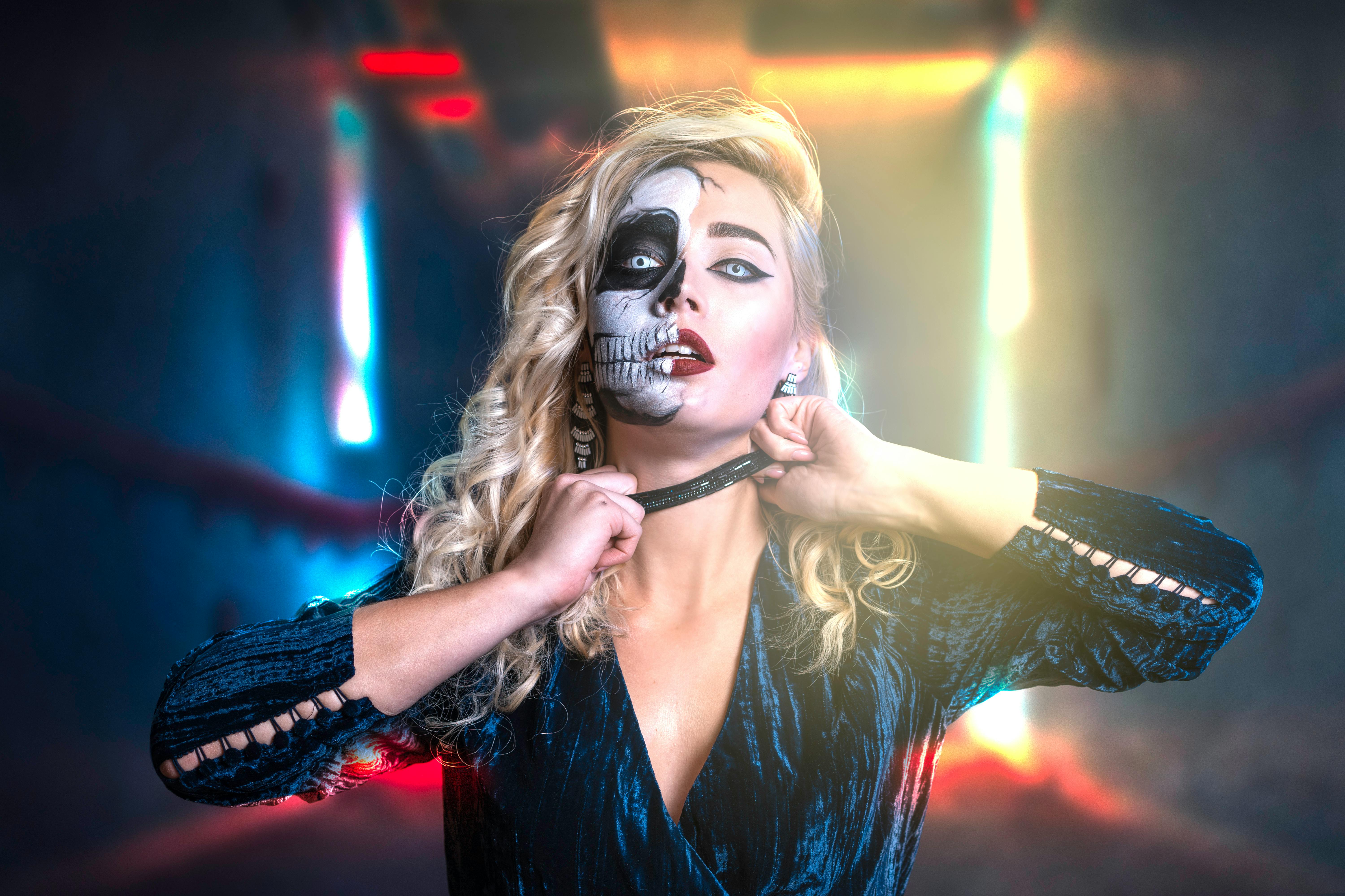 Reflection of Death-like Looking Figures in a Mirror · Free Stock Photo