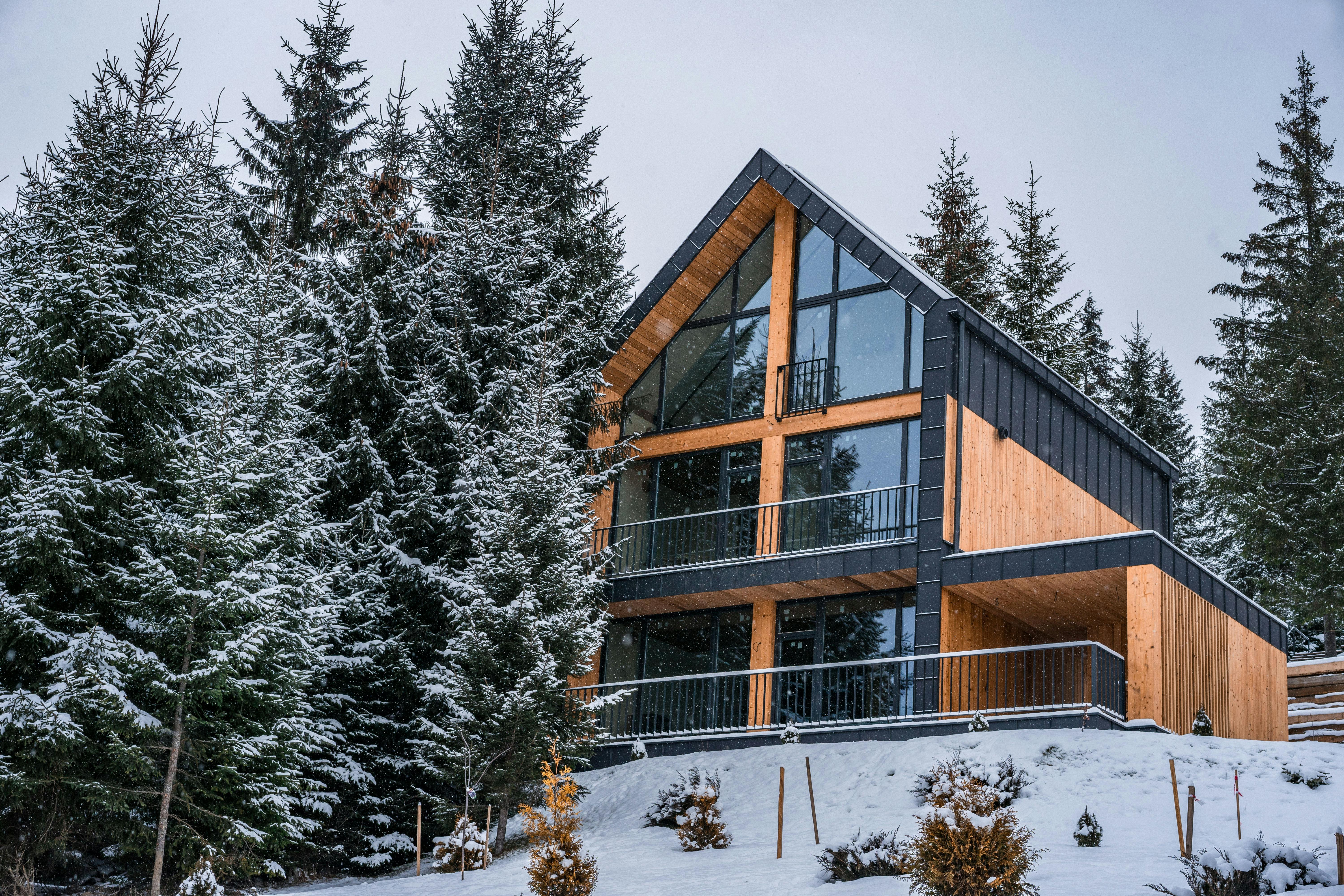 Modern Cottage on Hill in Winter Mountains · Free Stock Photo