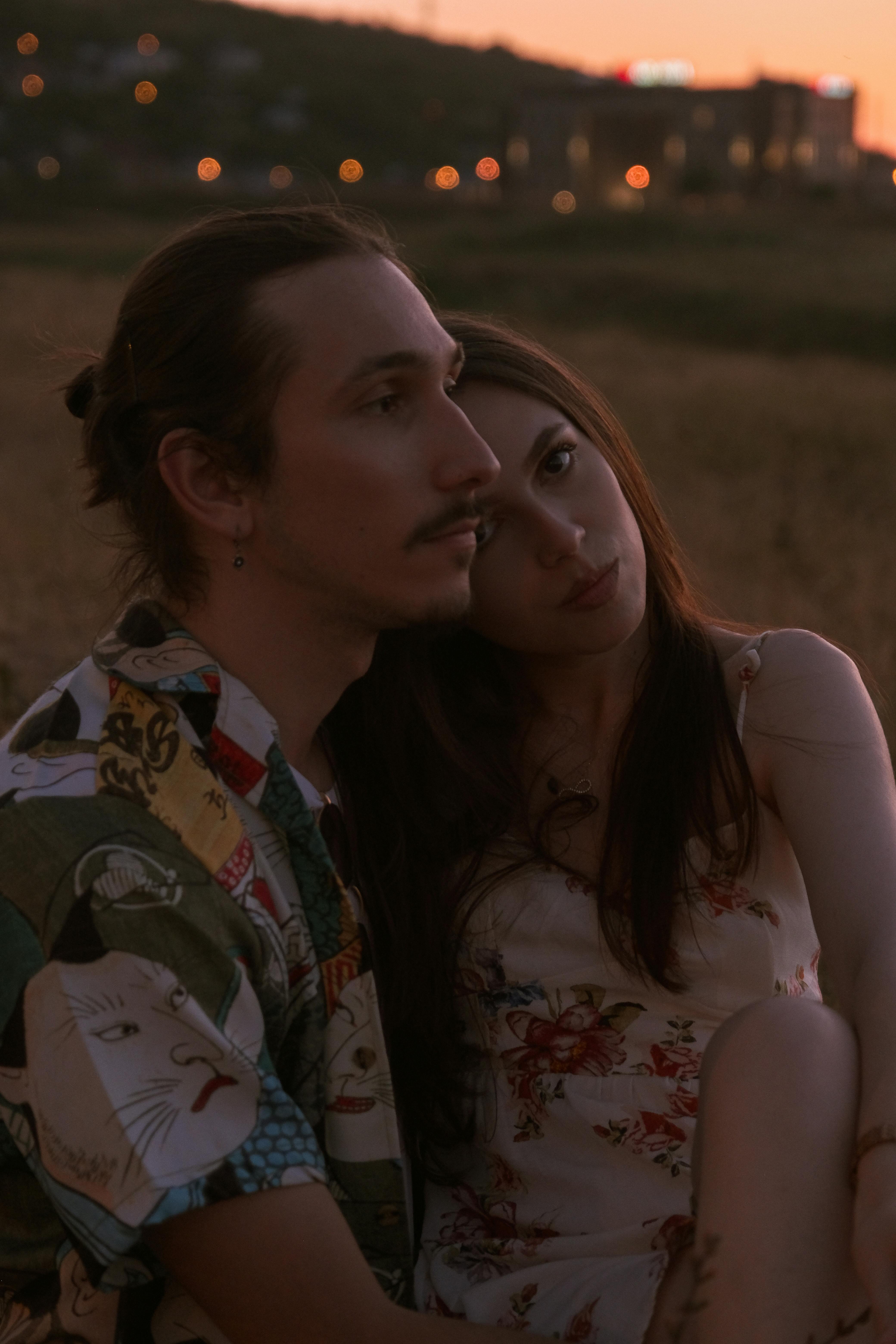 Romantic Couple Sitting on Sofa · Free Stock Photo