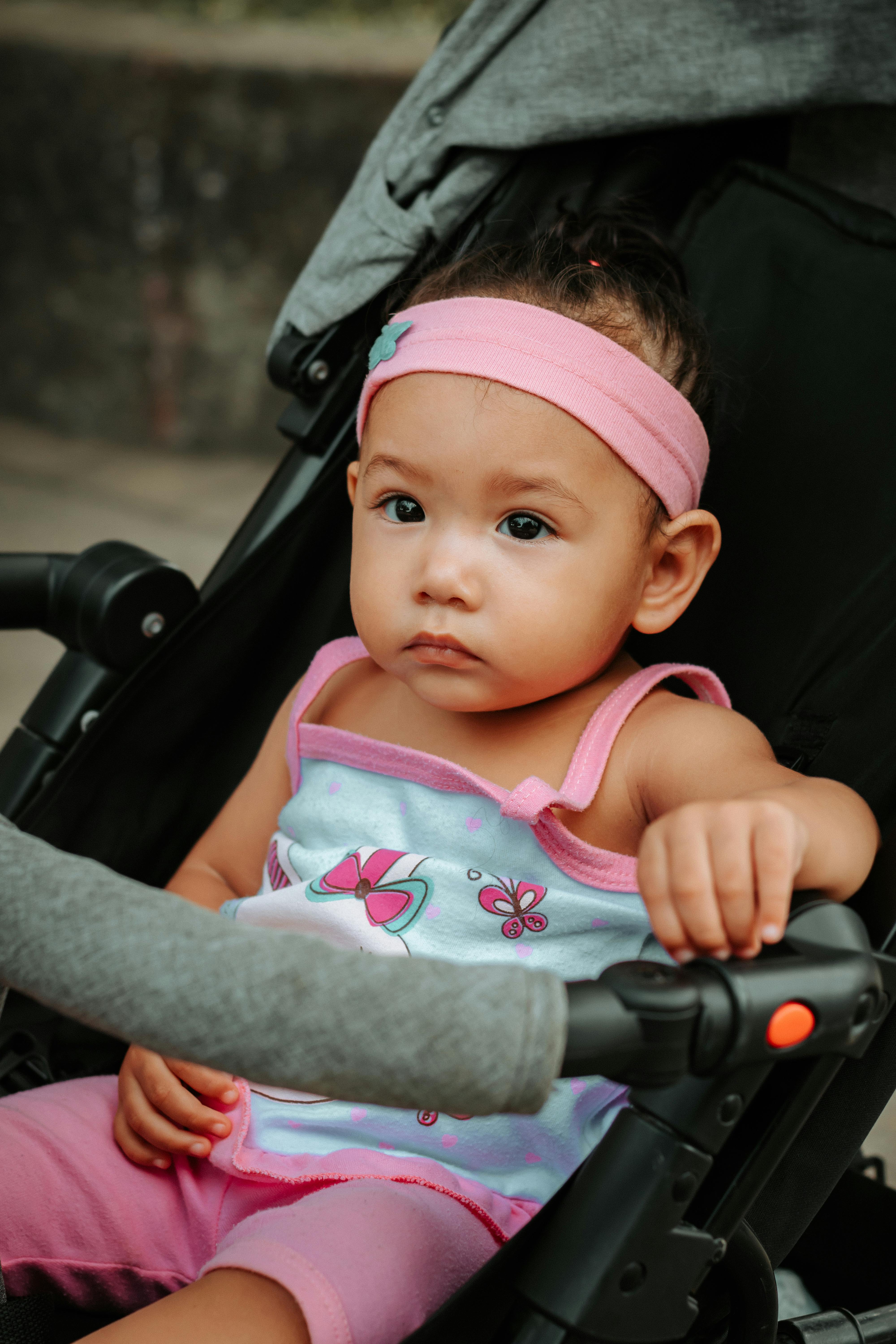 Child in Stroller · Free Stock Photo