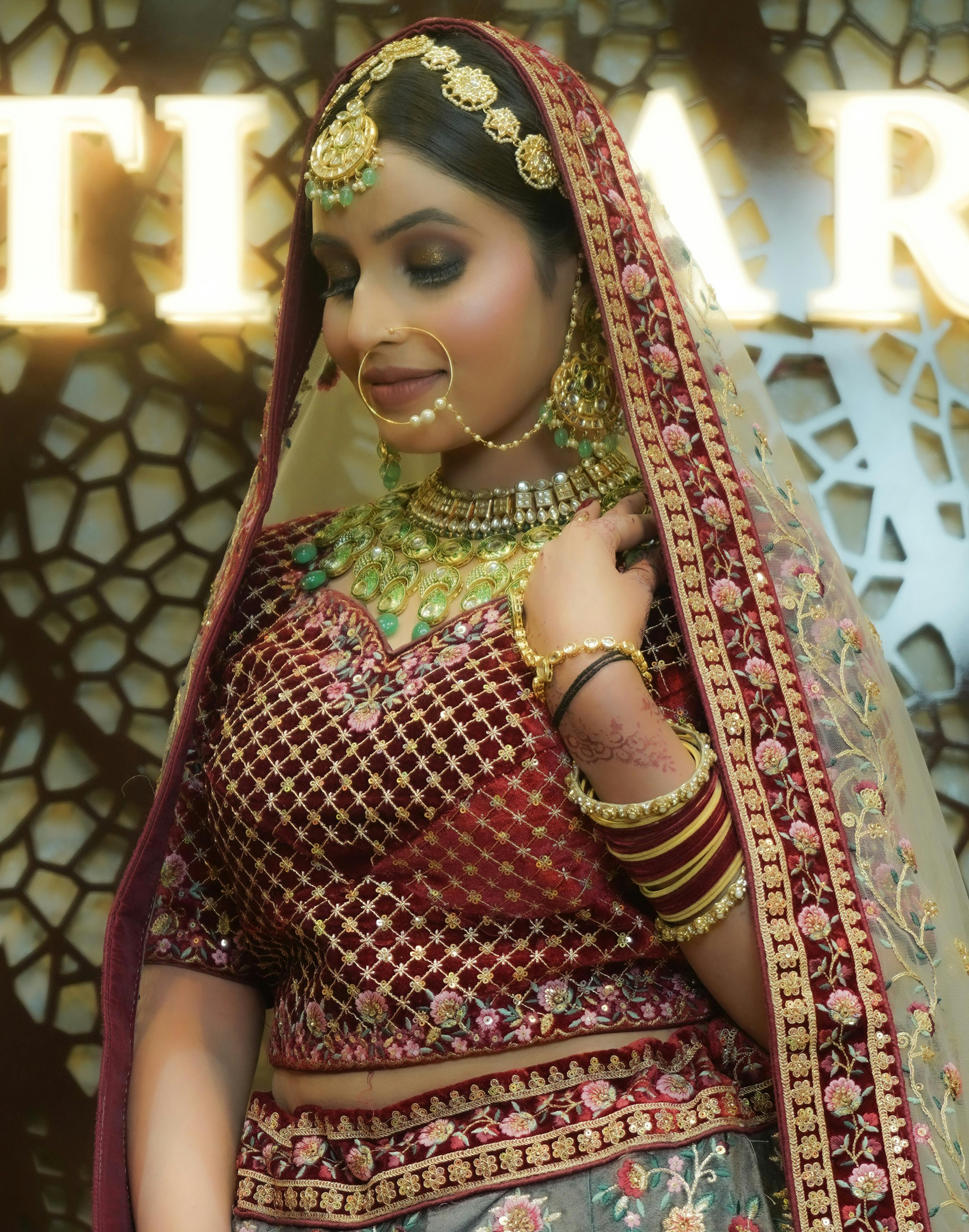 A Woman in Red and Gold Dress · Free Stock Photo