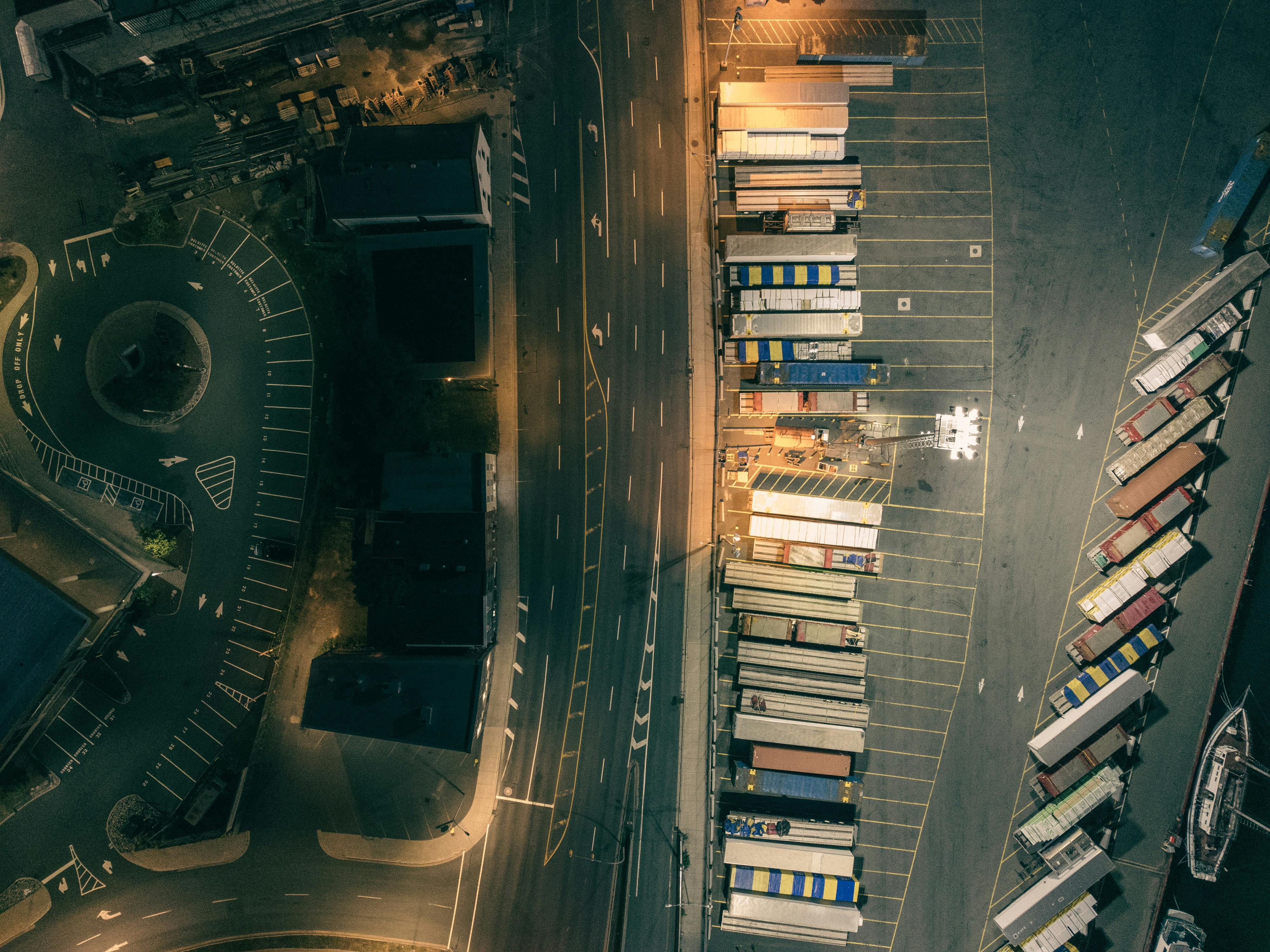 Drone Shot of Cargo Containers on a Parking Lot · Free Stock Photo