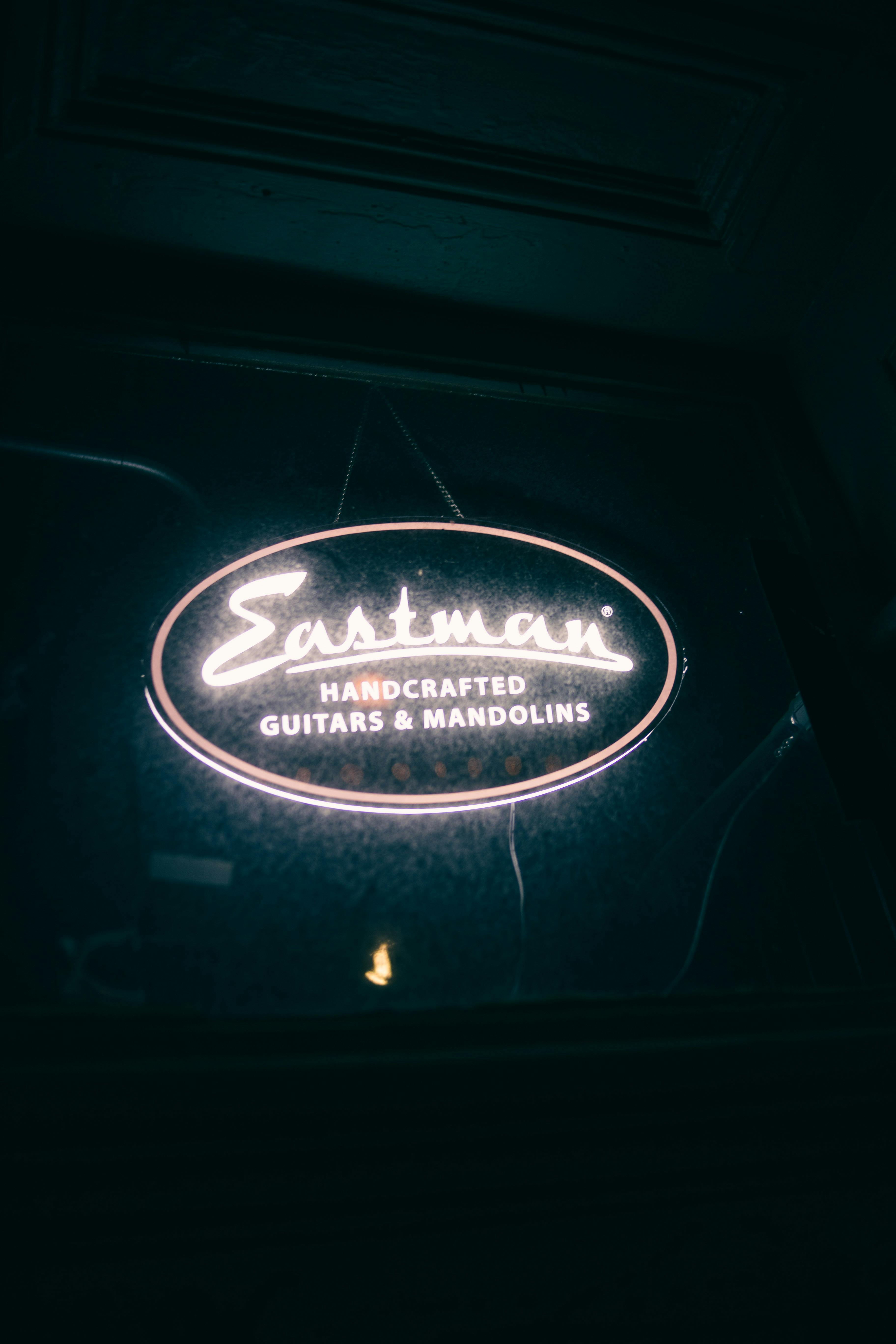 A LED Neon Signage on the Glass Window of a Café · Free Stock Photo