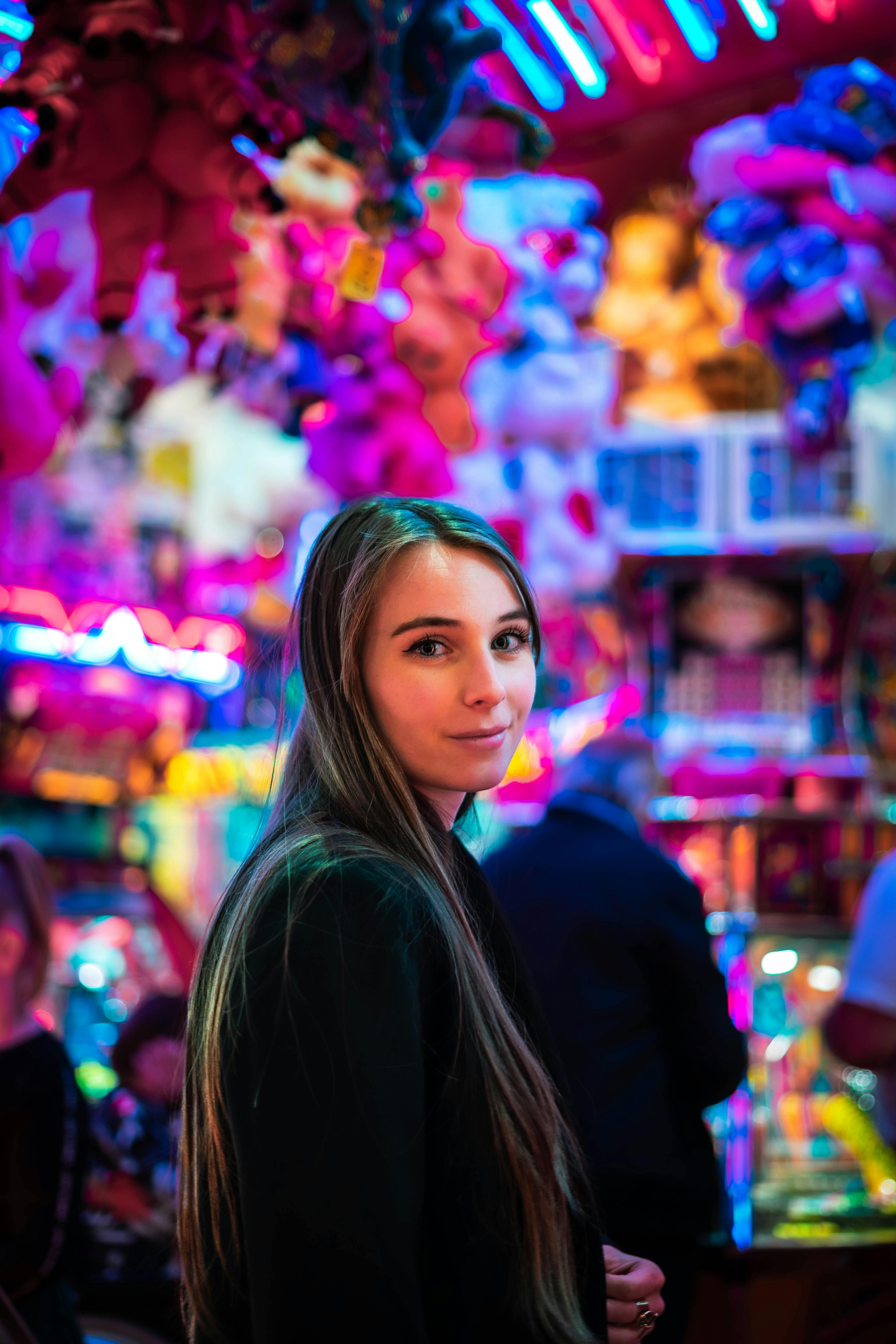 Woman Holding a Paintbrush Pointing on Woman's Nose · Free Stock Photo