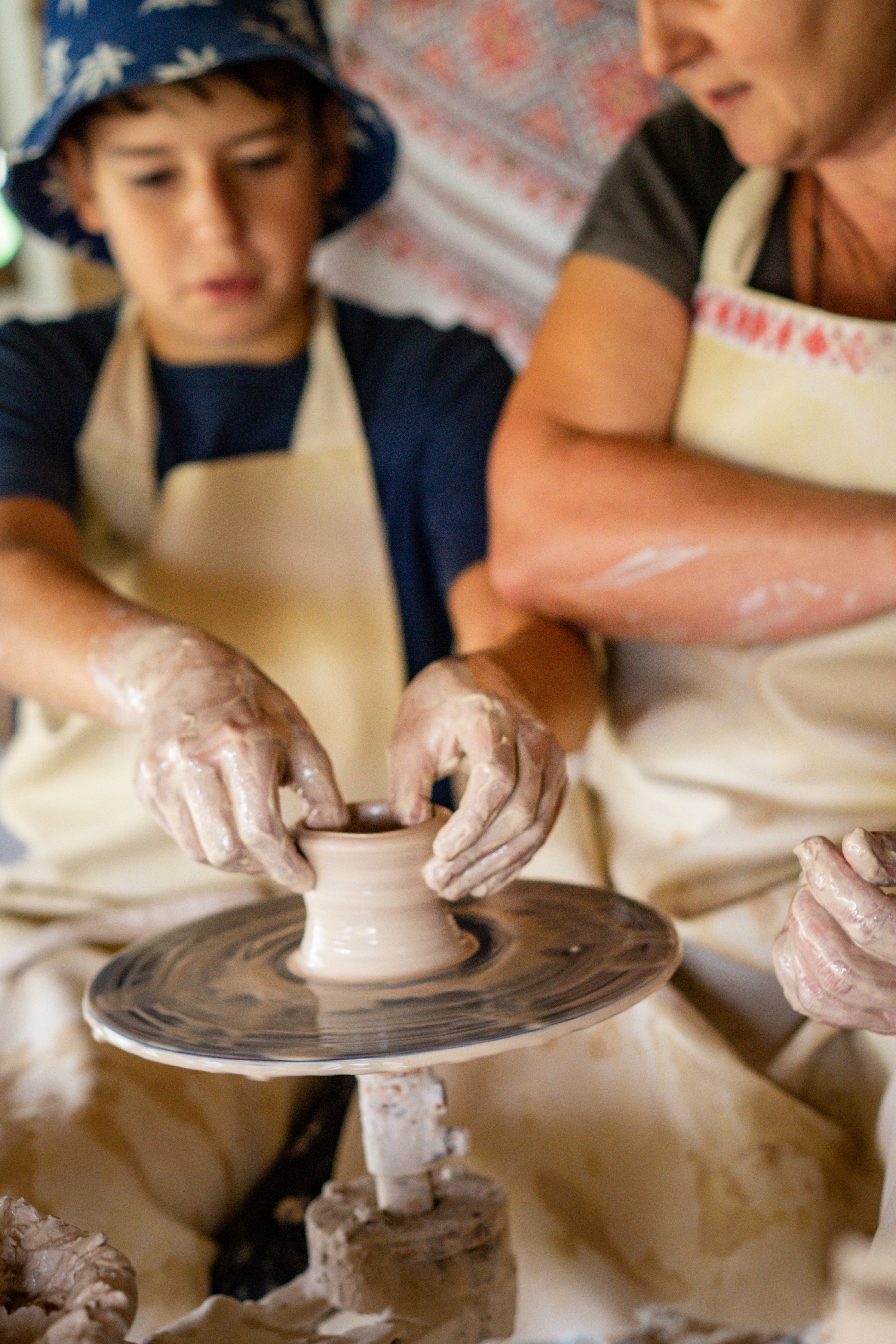 Woman Teaching Boy Clay Handcraft · Free Stock Photo