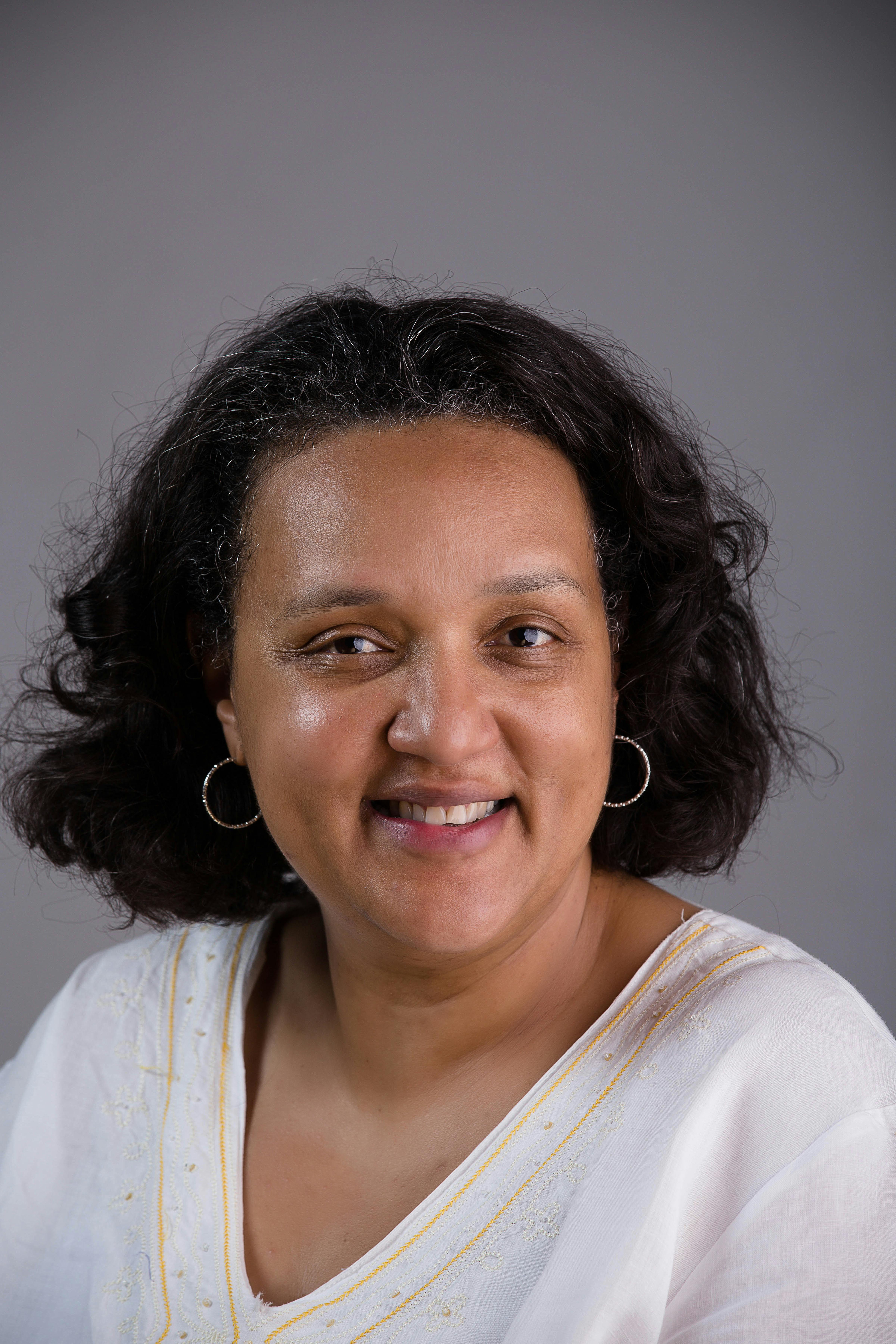 Close-Up Shot of a Woman Smiling · Free Stock Photo