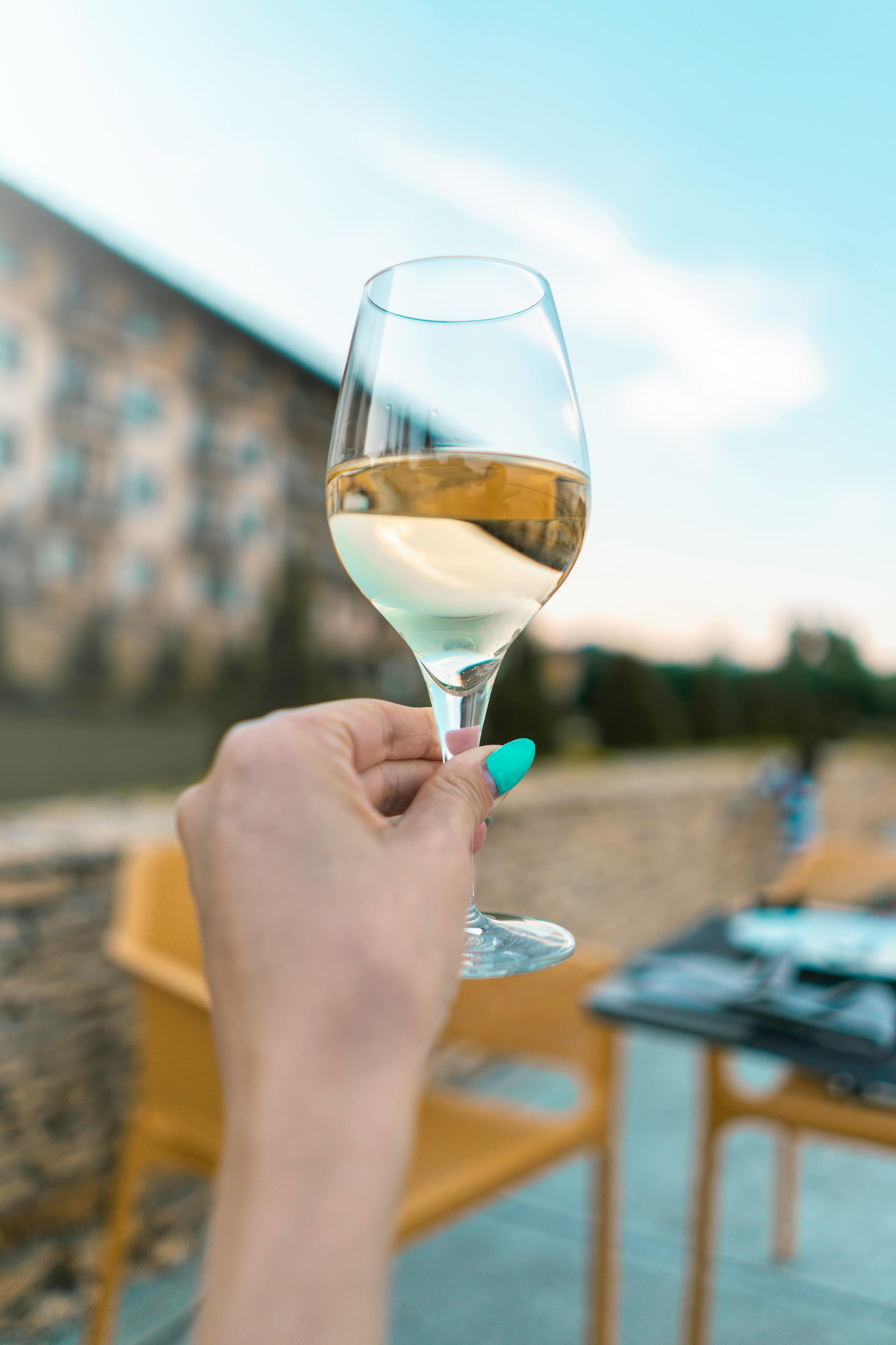 Person Holding A Shot Glass · Free Stock Photo