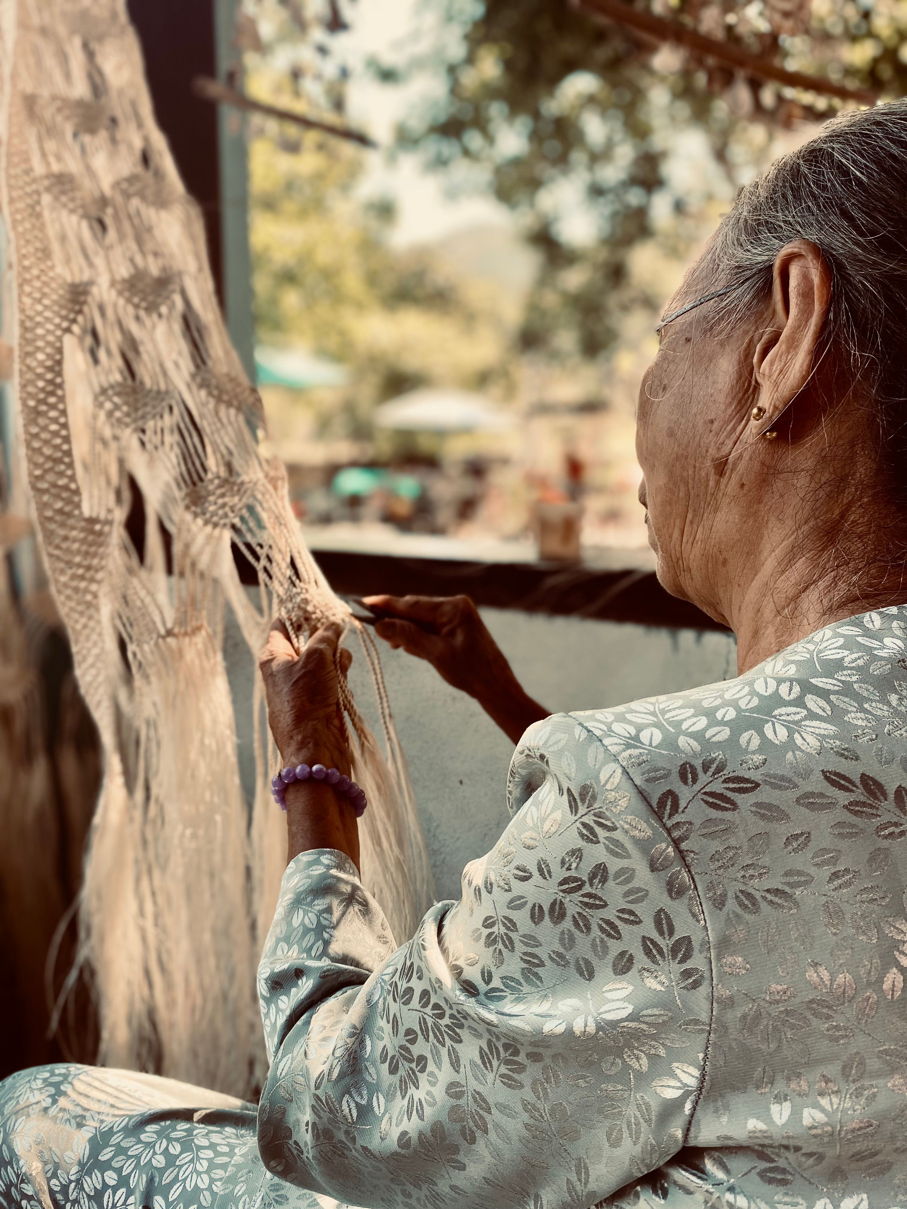 An Elderly Woman making an Handmade Weaving · Free Stock Photo