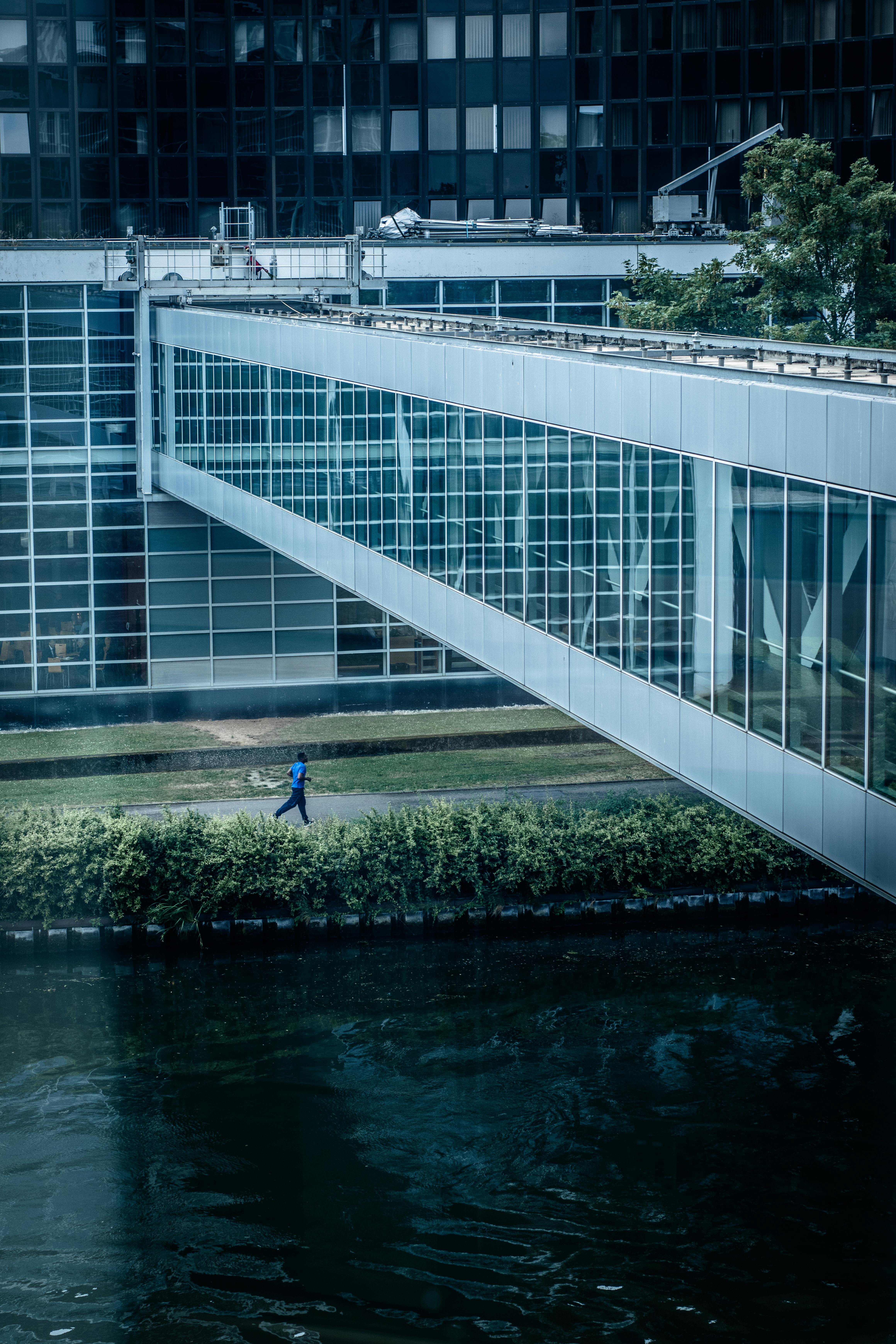 Photo of a Person Running around Columns · Free Stock Photo