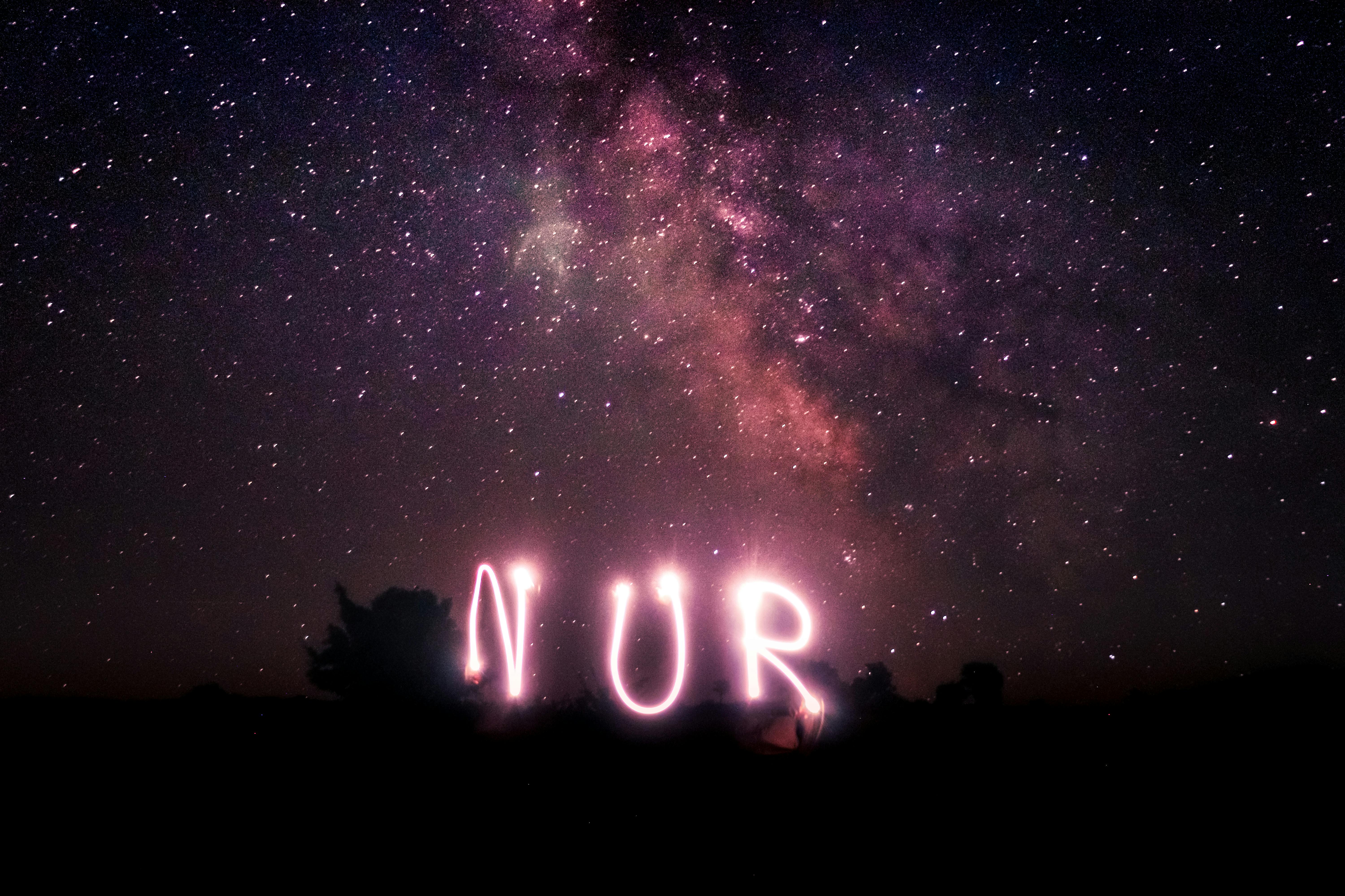 Writing in the Night Sky with Long Exposure · Free Stock Photo