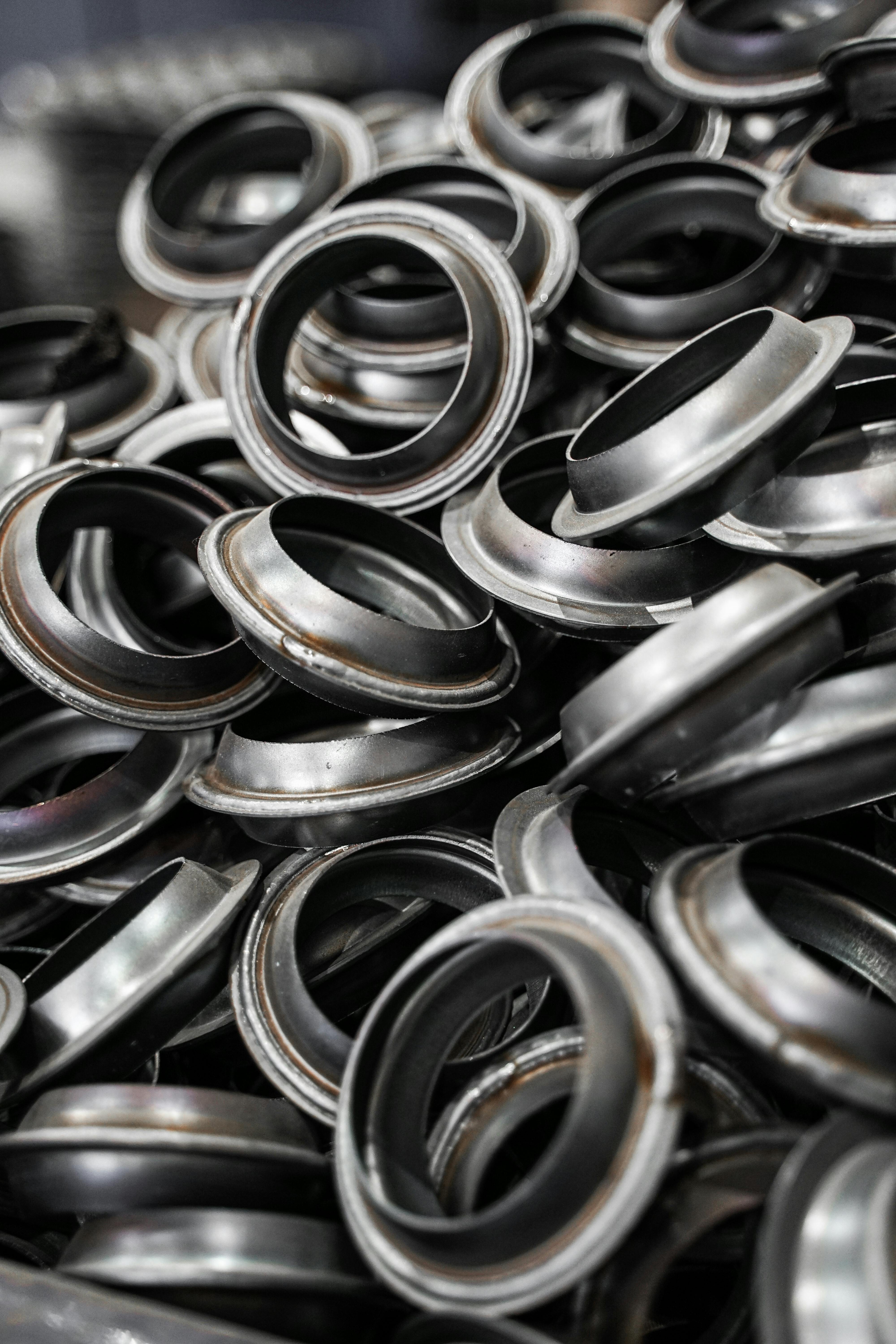 Pile of Stainless Steel Coupling Rings · Free Stock Photo