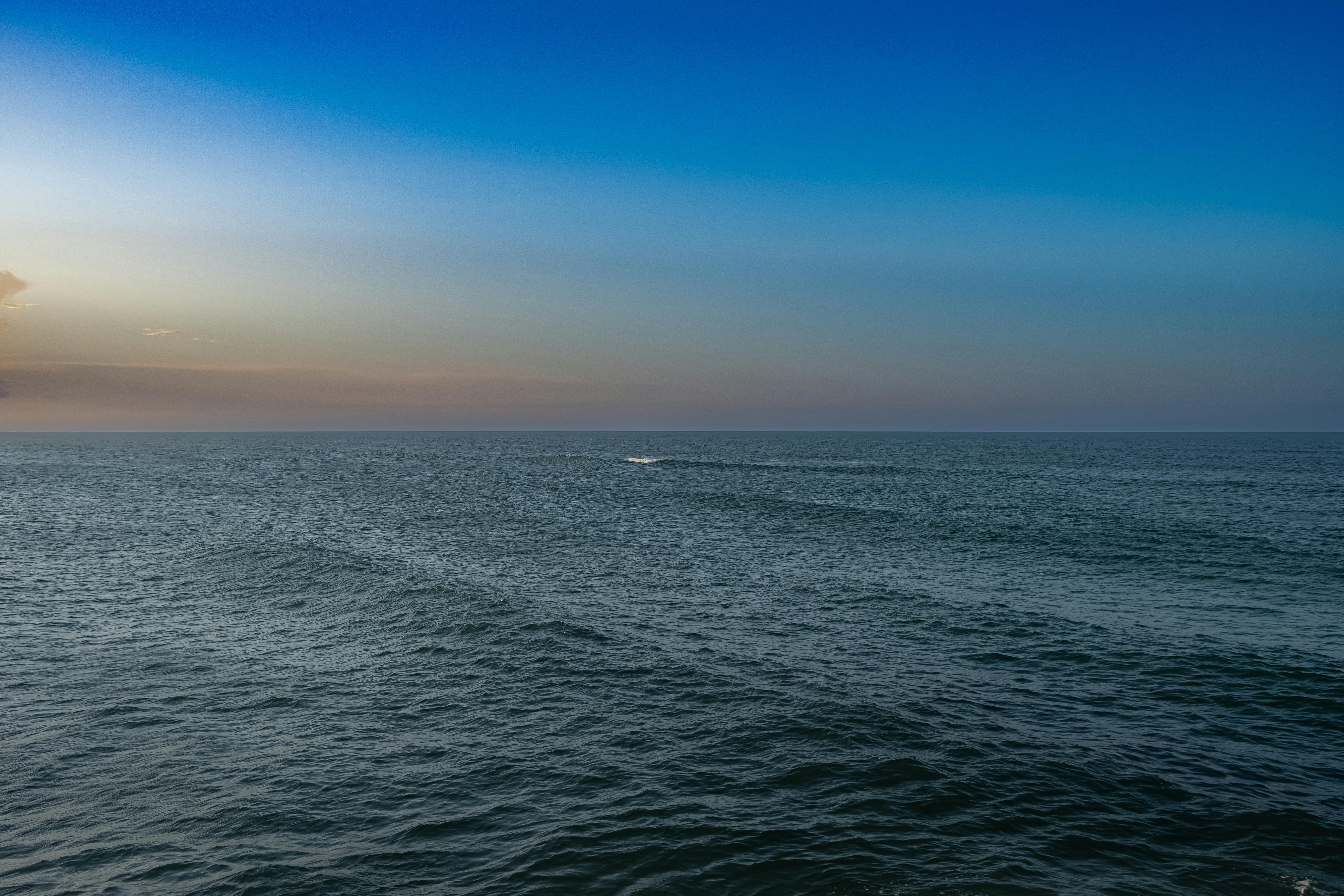 Blue Ocean Under the Blue Sky · Free Stock Photo