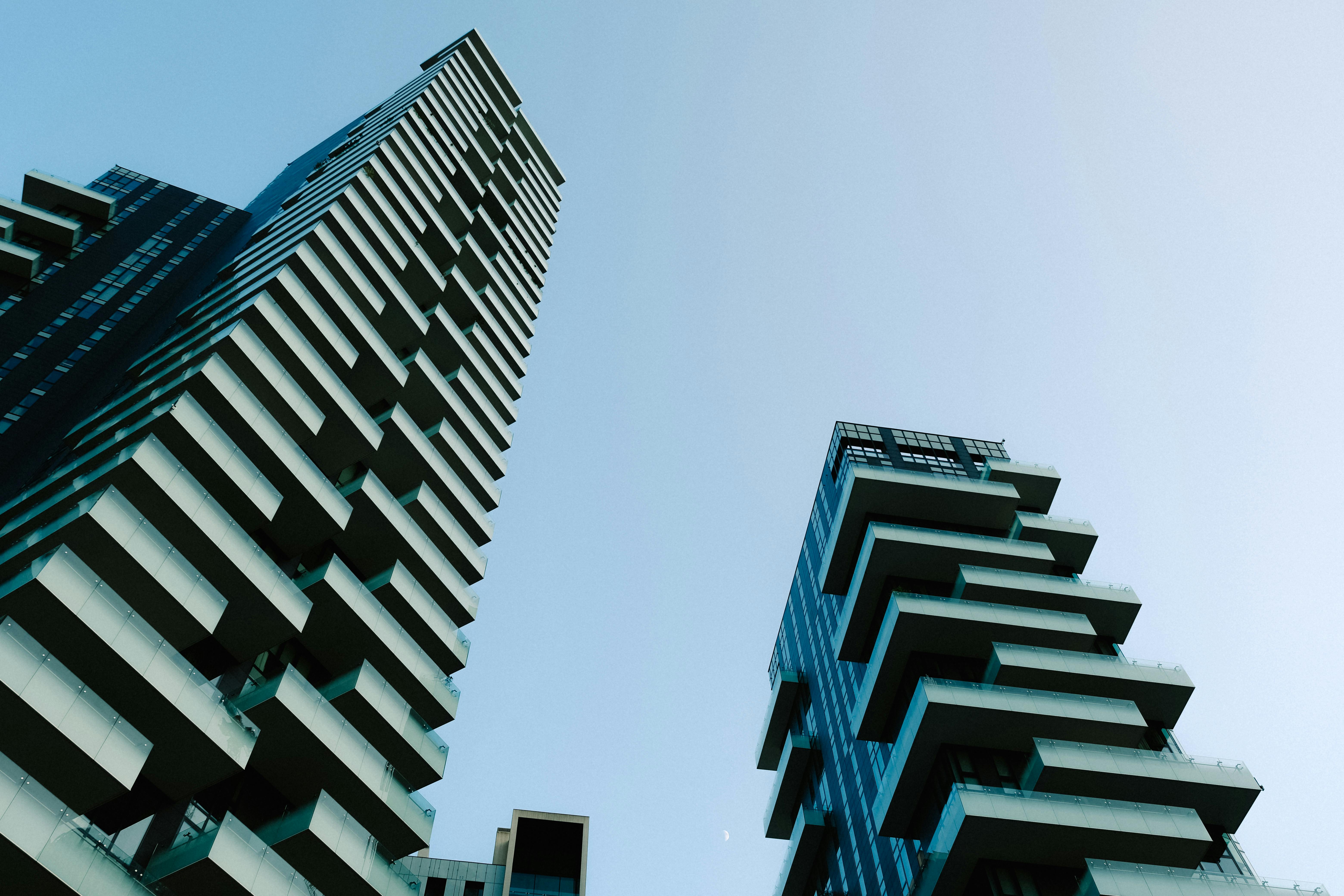 Low-Angle Photography of High Rise Building during Night Time · Free ...