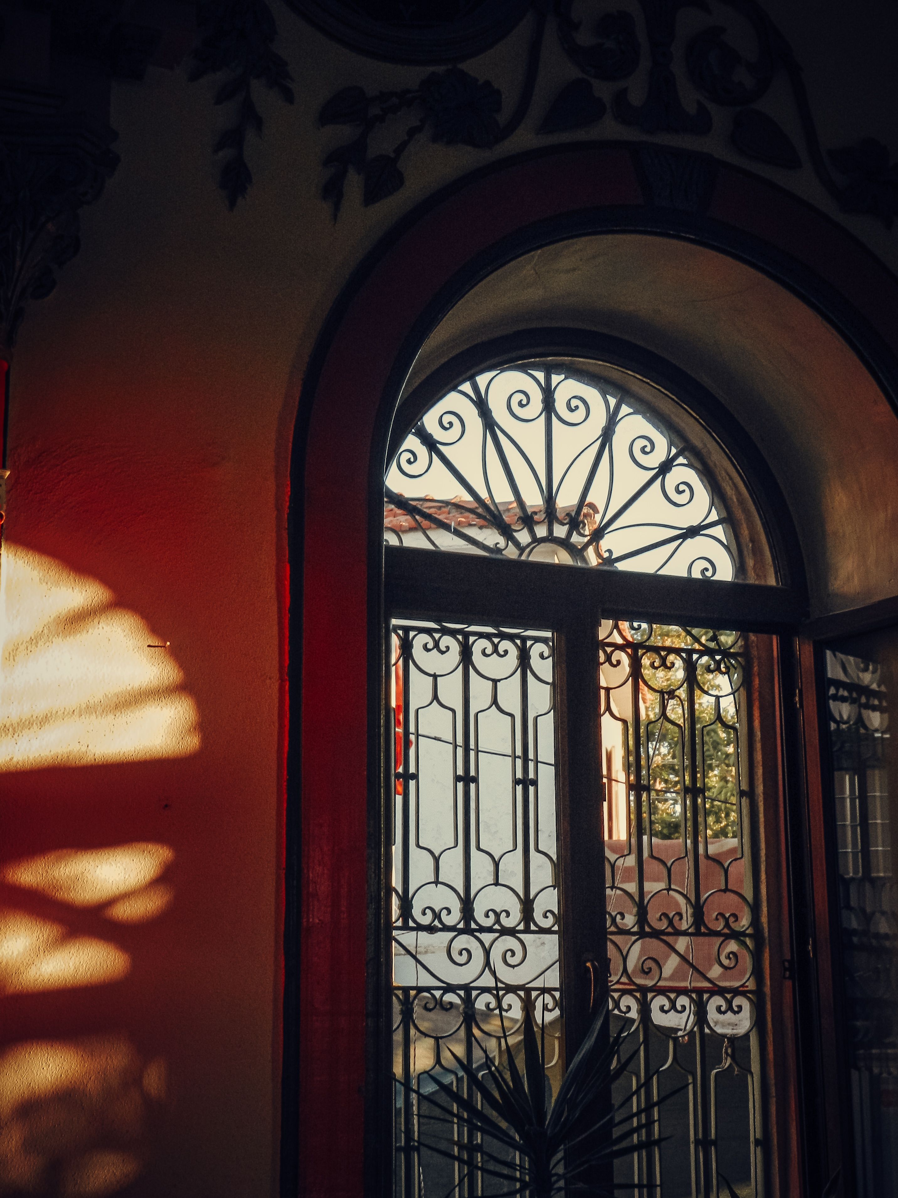 Photo of Arched Windows on Building Taken at Night · Free Stock Photo