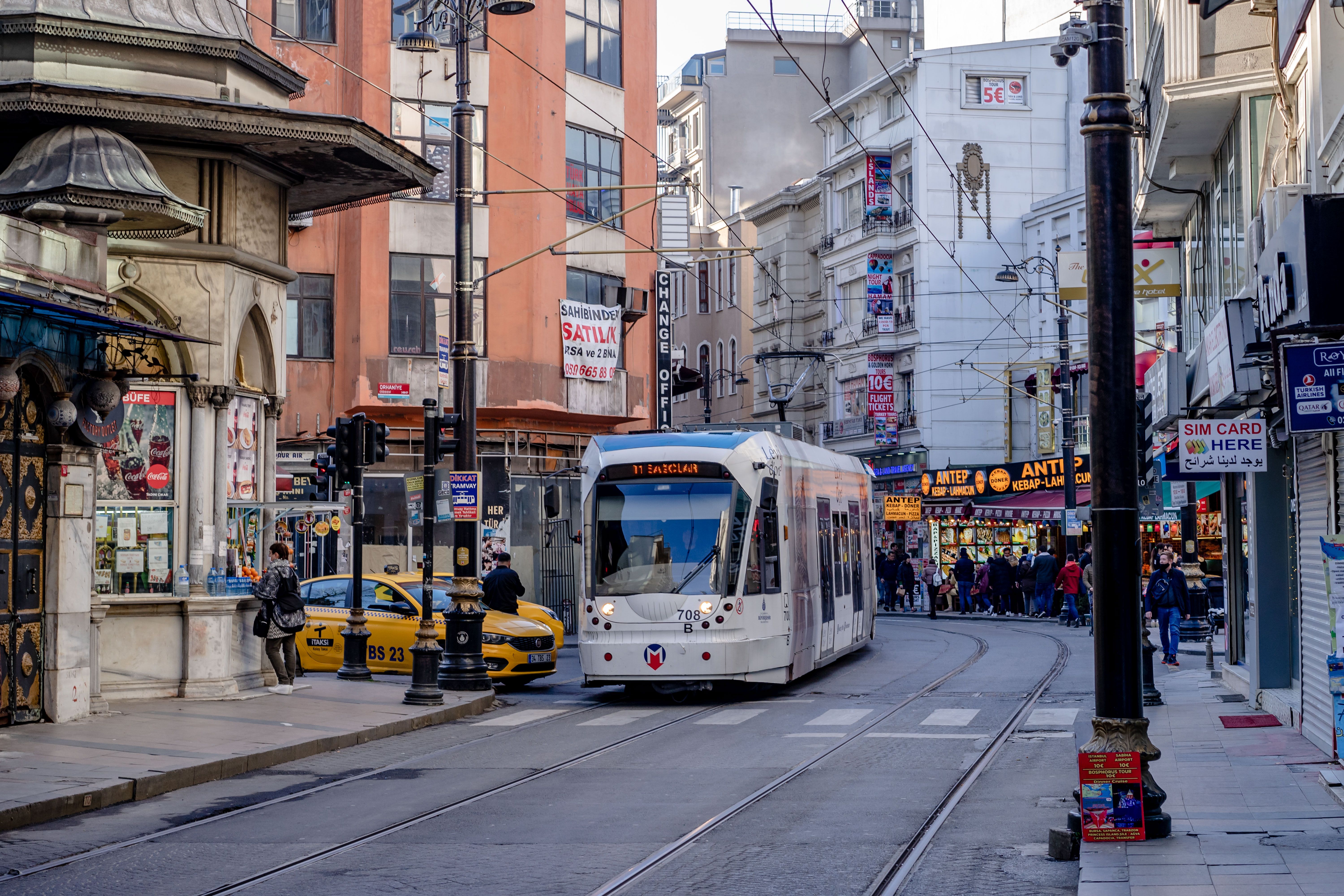 Tram Driving through City Street · Free Stock Photo