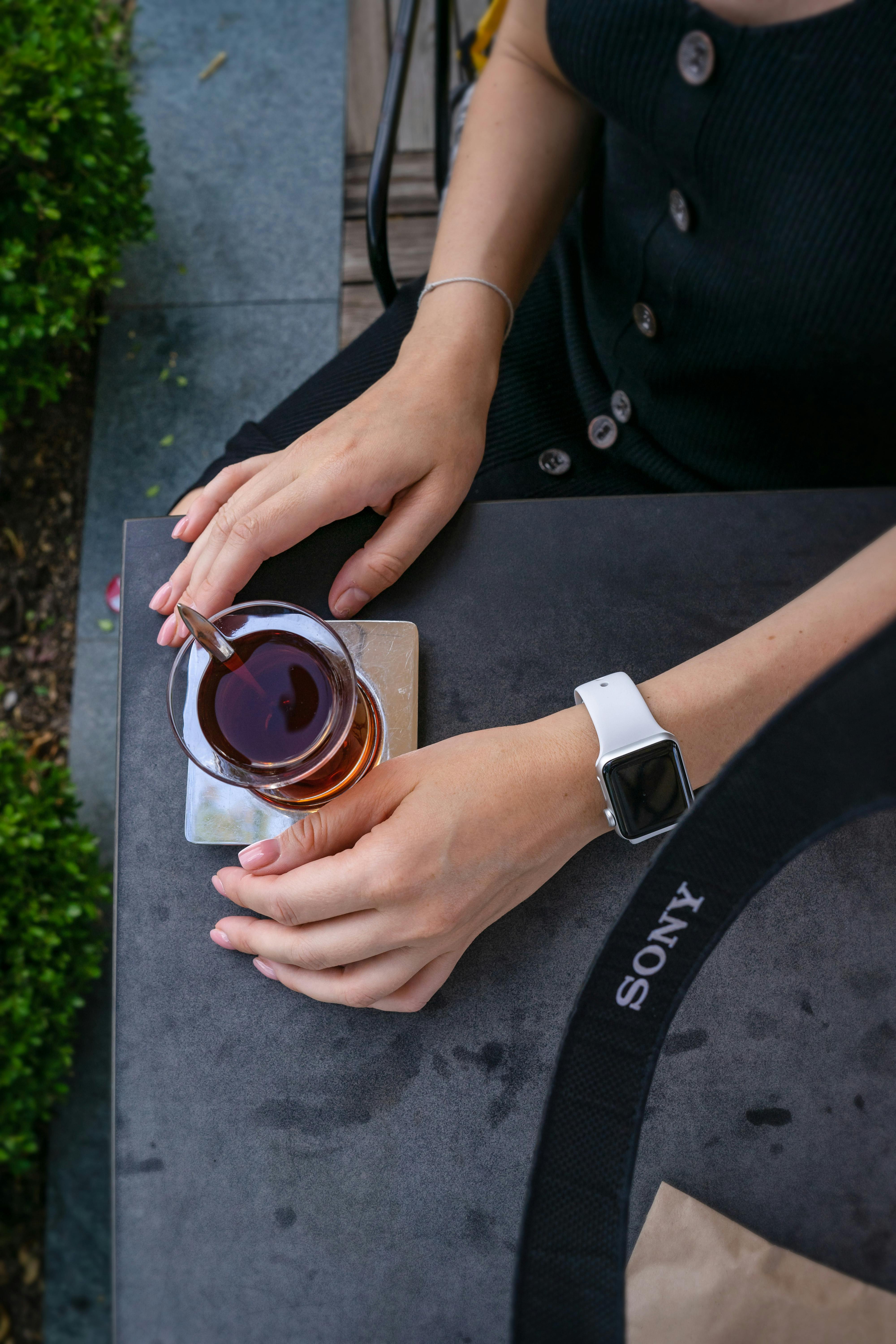 Woman in Traditional Dress Drinking Tea · Free Stock Photo