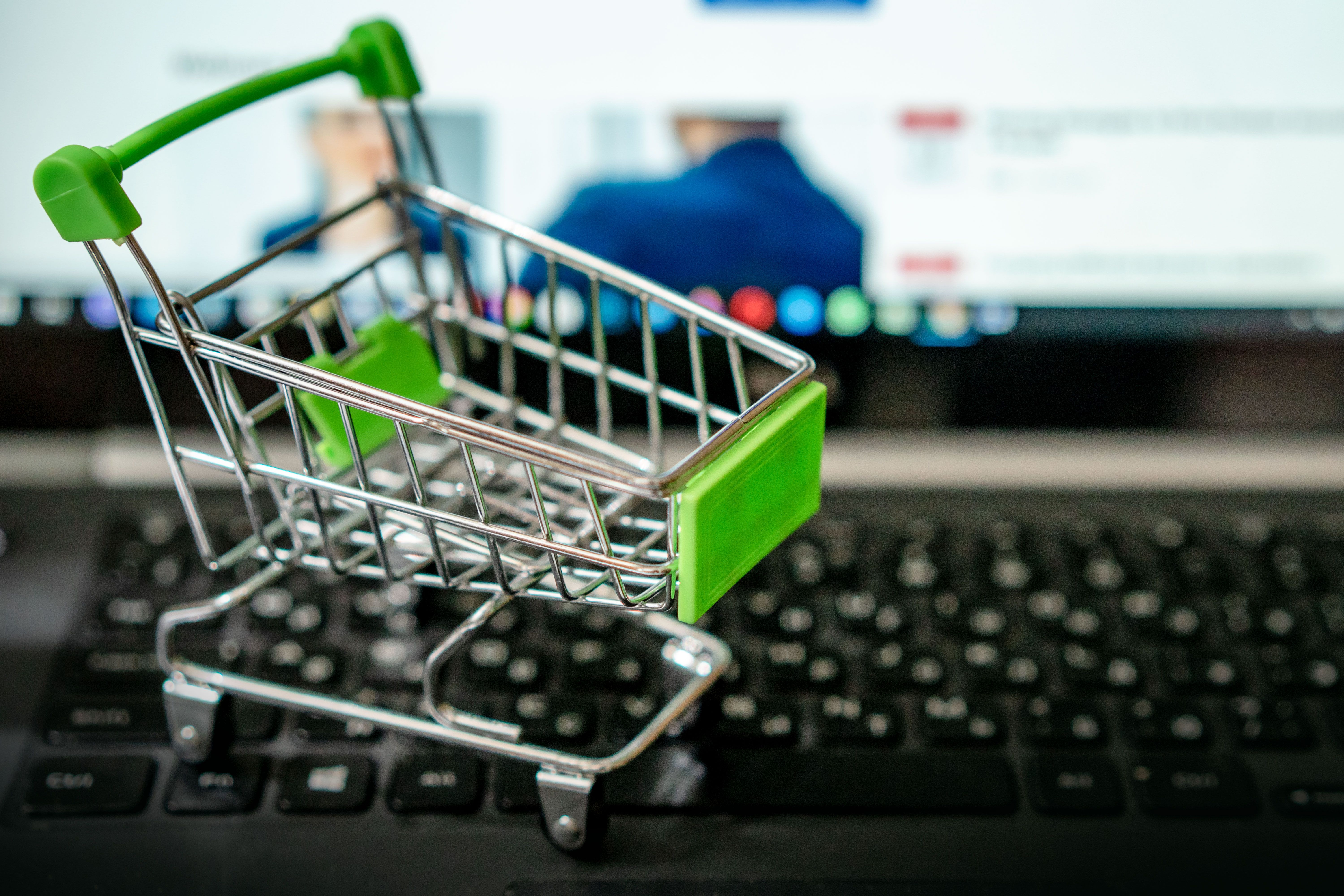 Close-Up Photo of a Miniature Shopping Cart · Free Stock Photo