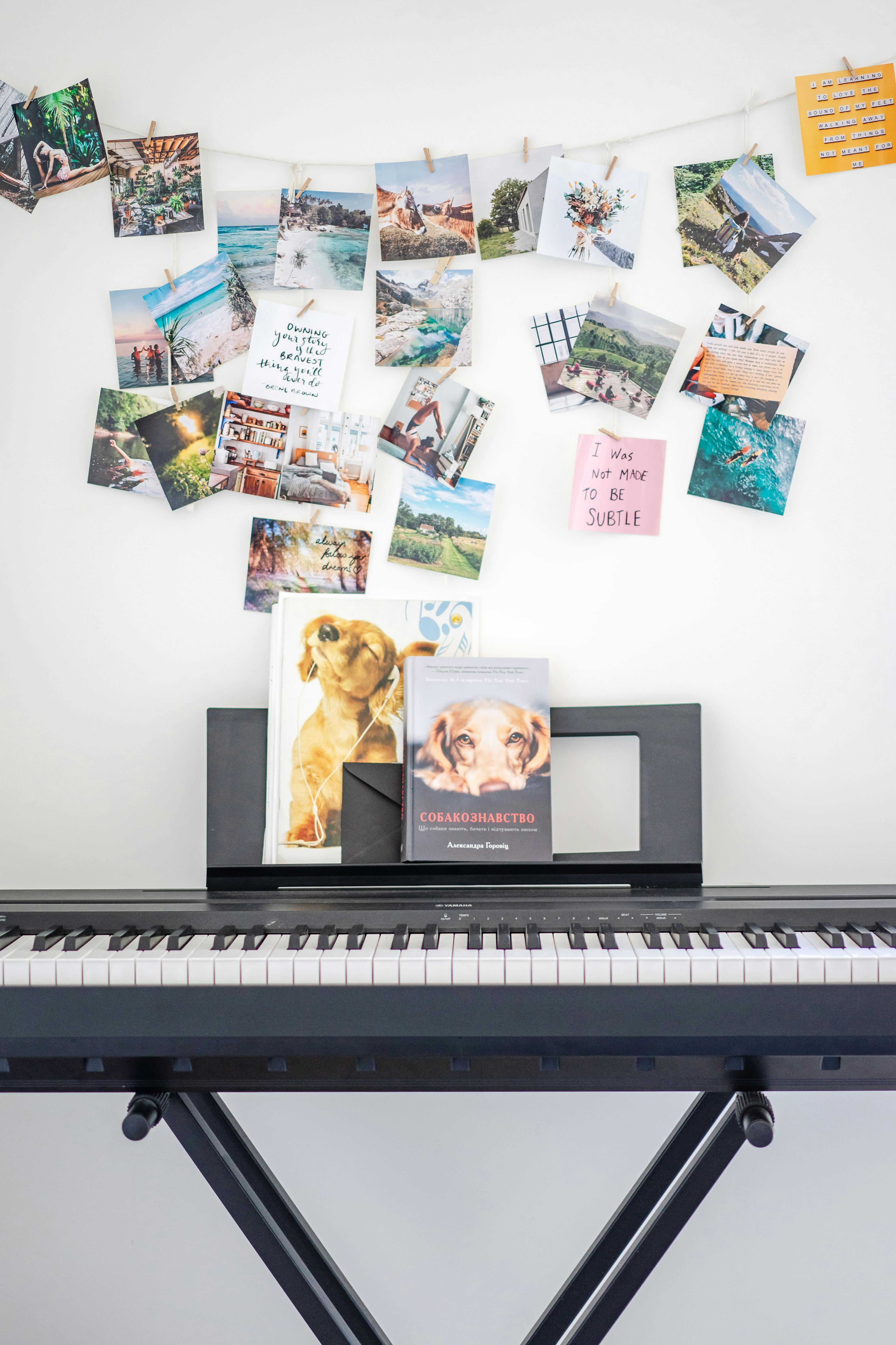 Keyboard and Photos on Wall · Free Stock Photo