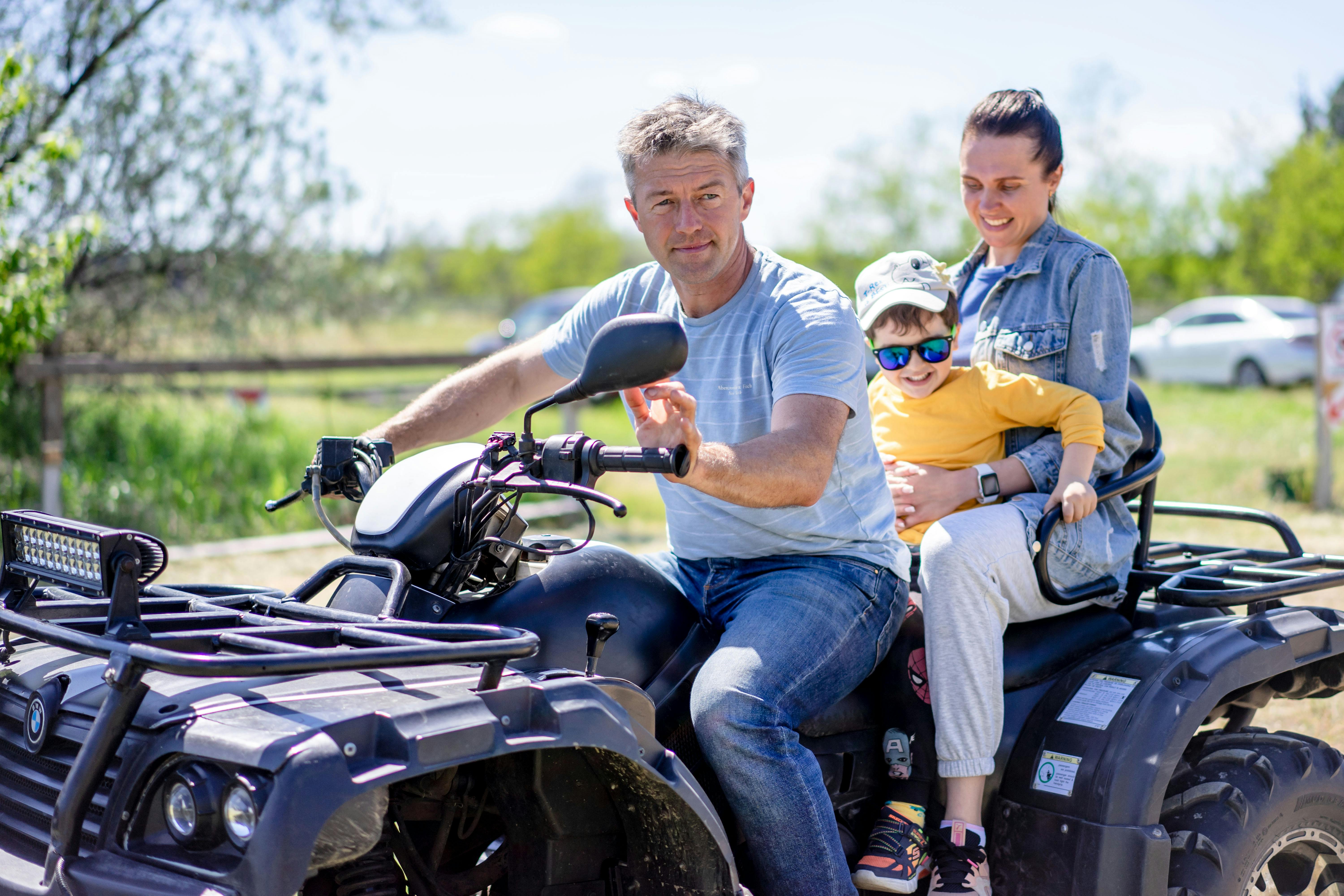 A Man Riding an All Terrain Vehicle · Free Stock Photo