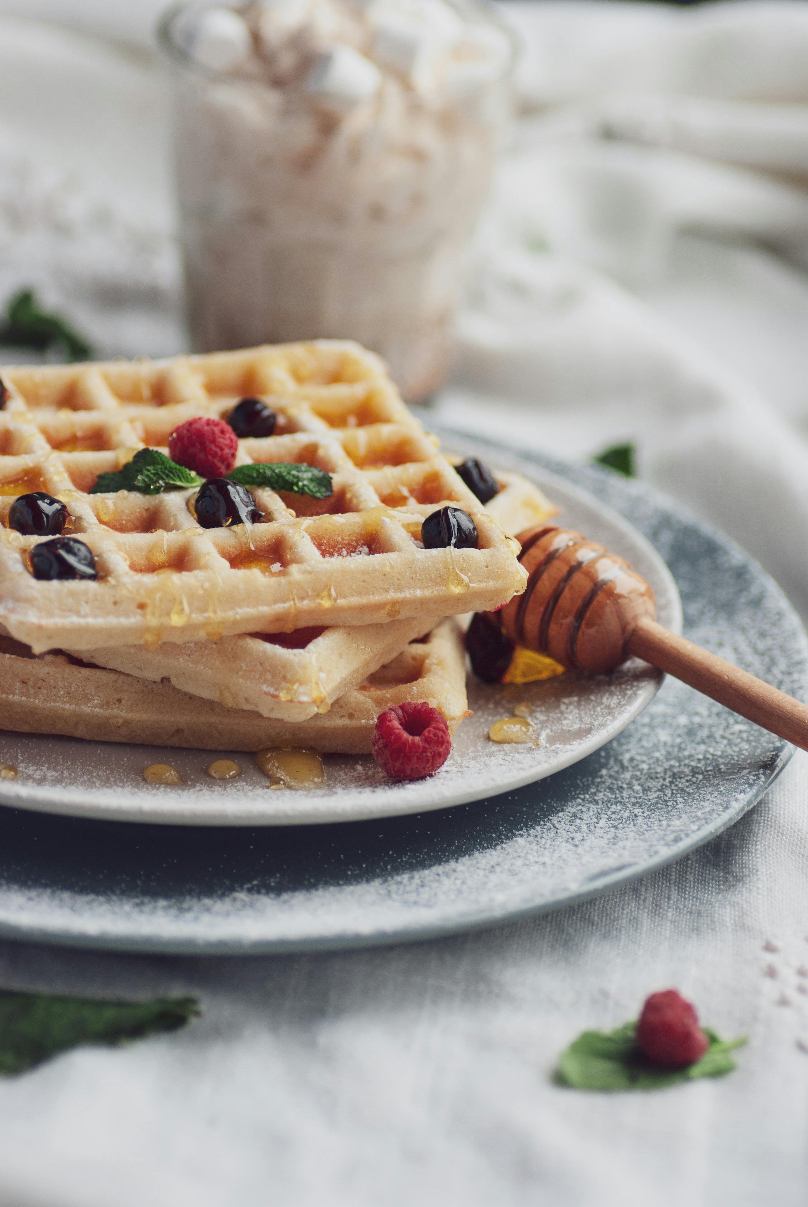 Two Waffle Slices On White Plate · Free Stock Photo