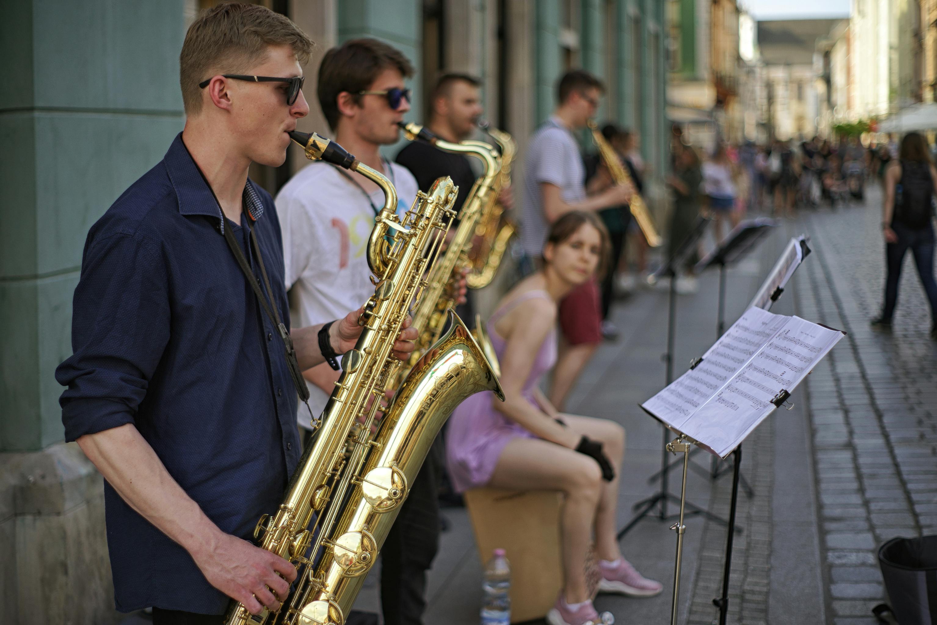 Street Musicians Playing the Saxophones · Free Stock Photo