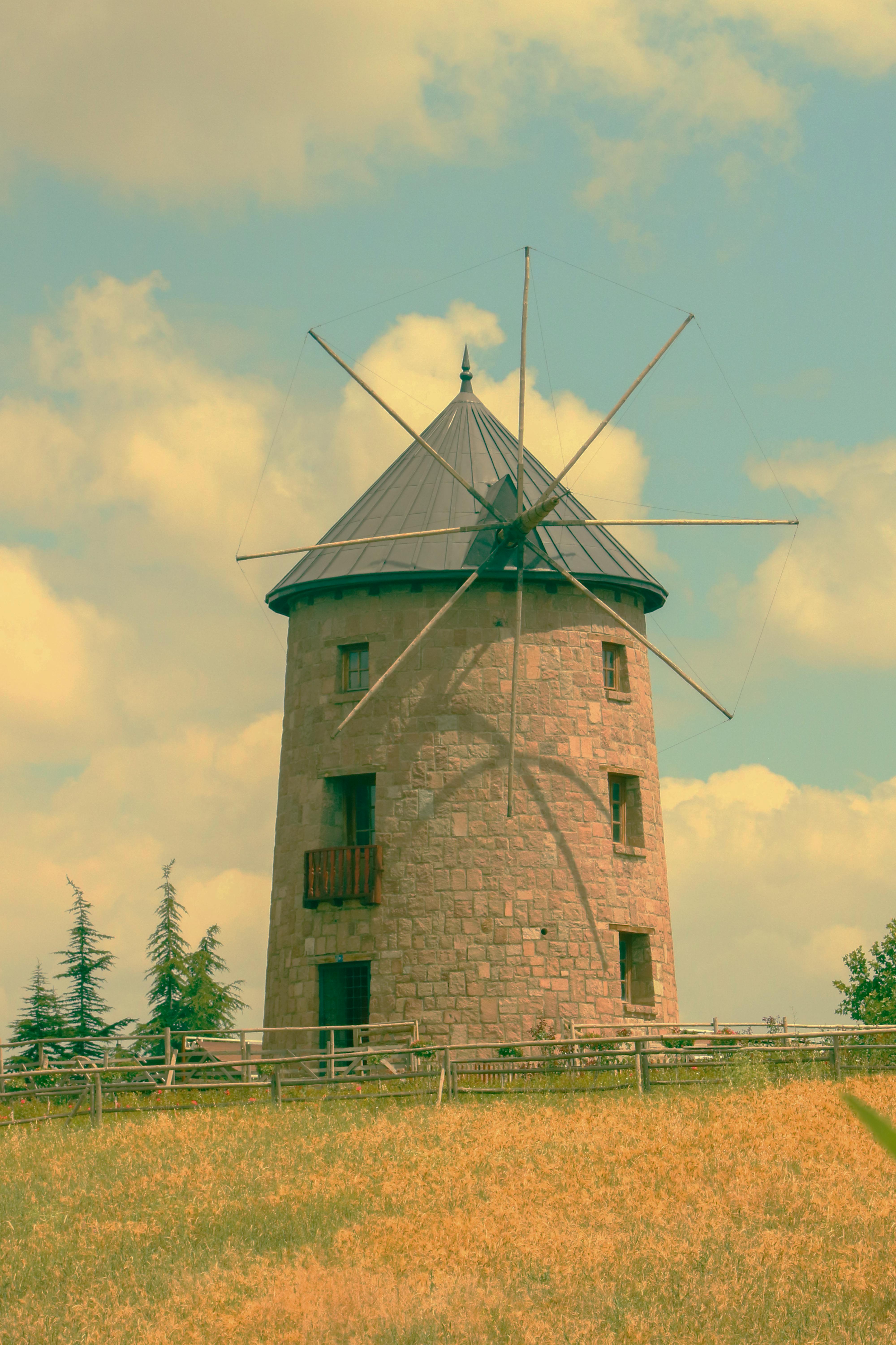 A Brown Concrete Windmill · Free Stock Photo