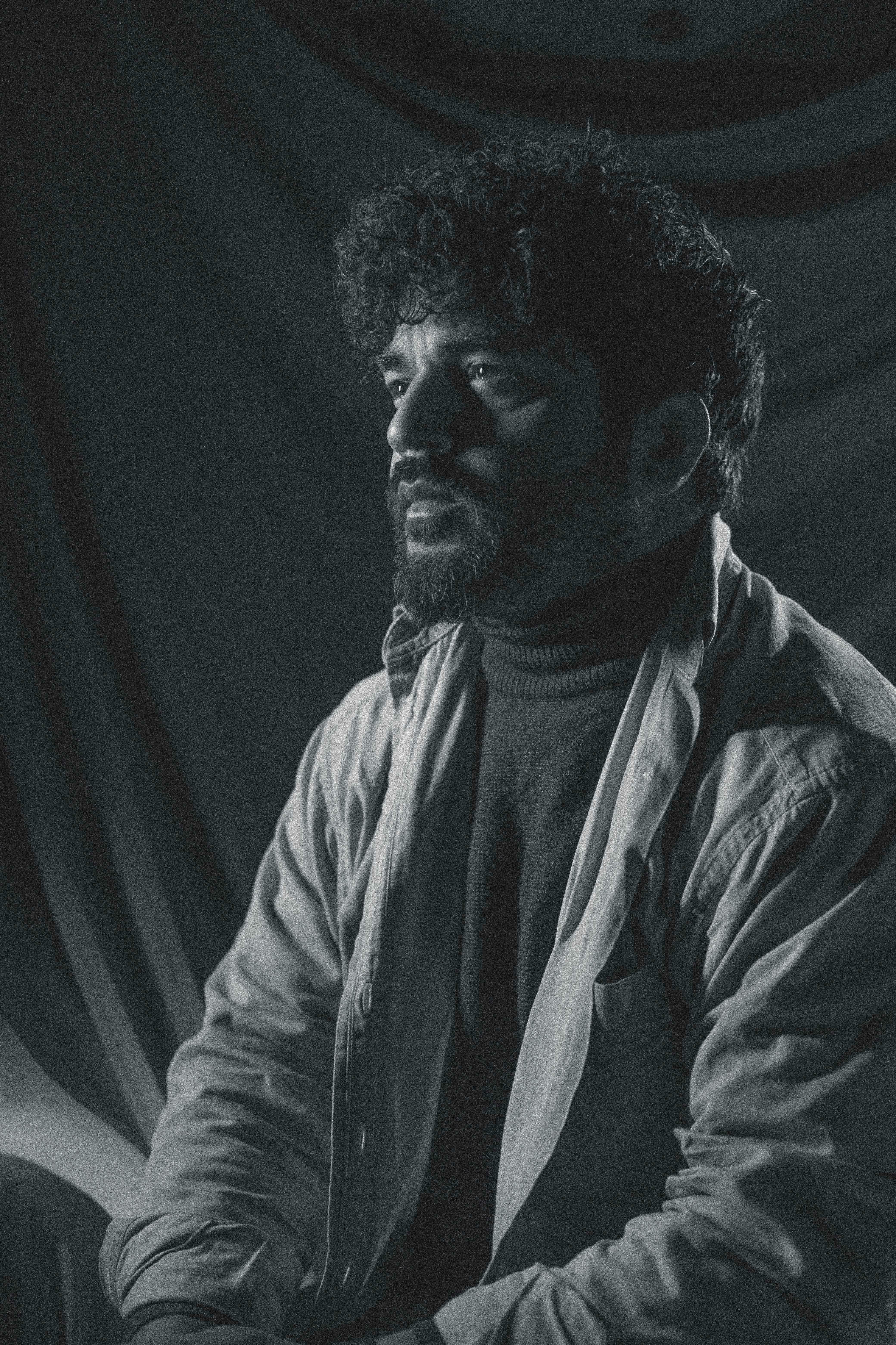 Grayscale Photo of a Man in Black Turtleneck Shirt · Free Stock Photo