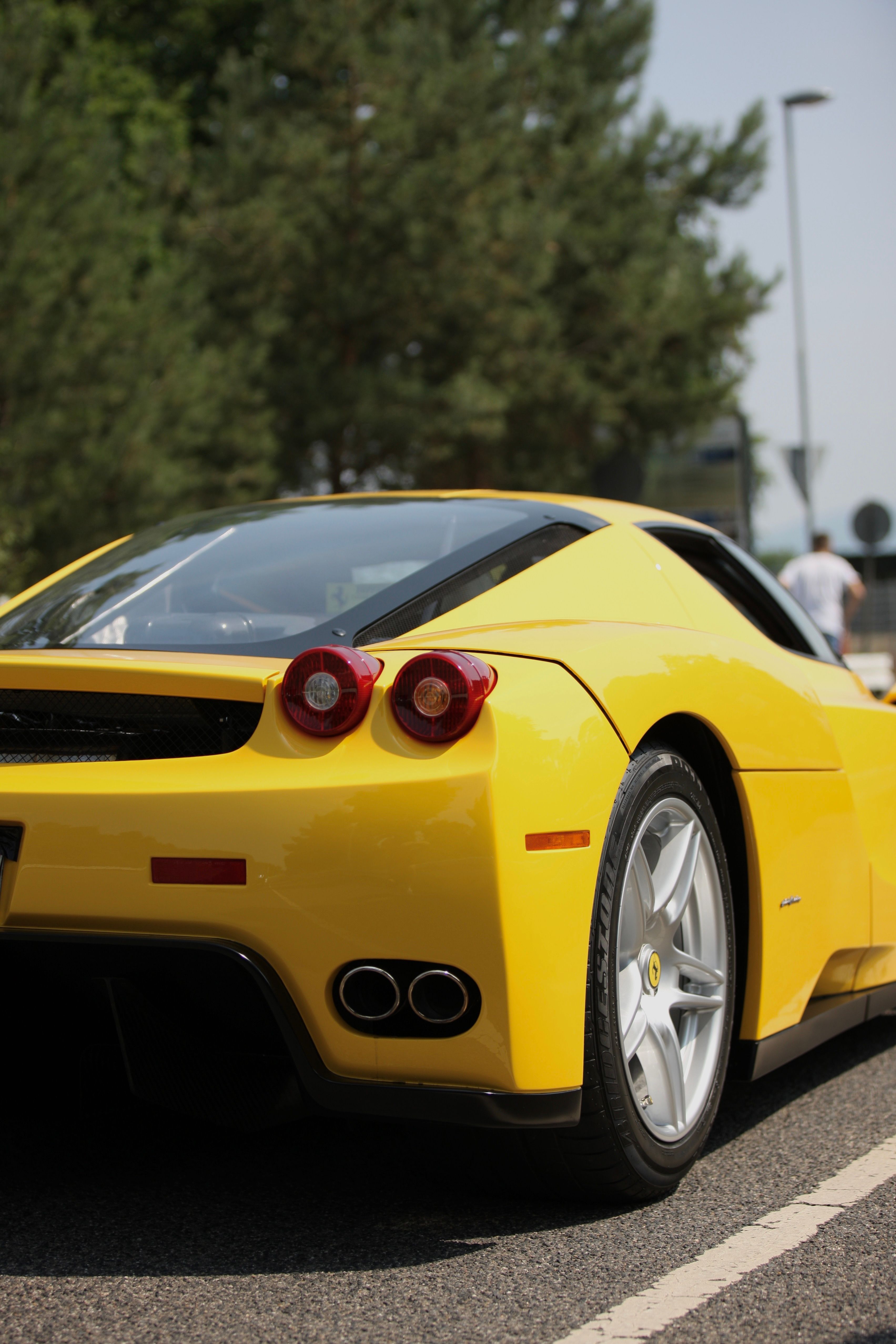 Photo of Red Coupe Parked in Pavement · Free Stock Photo