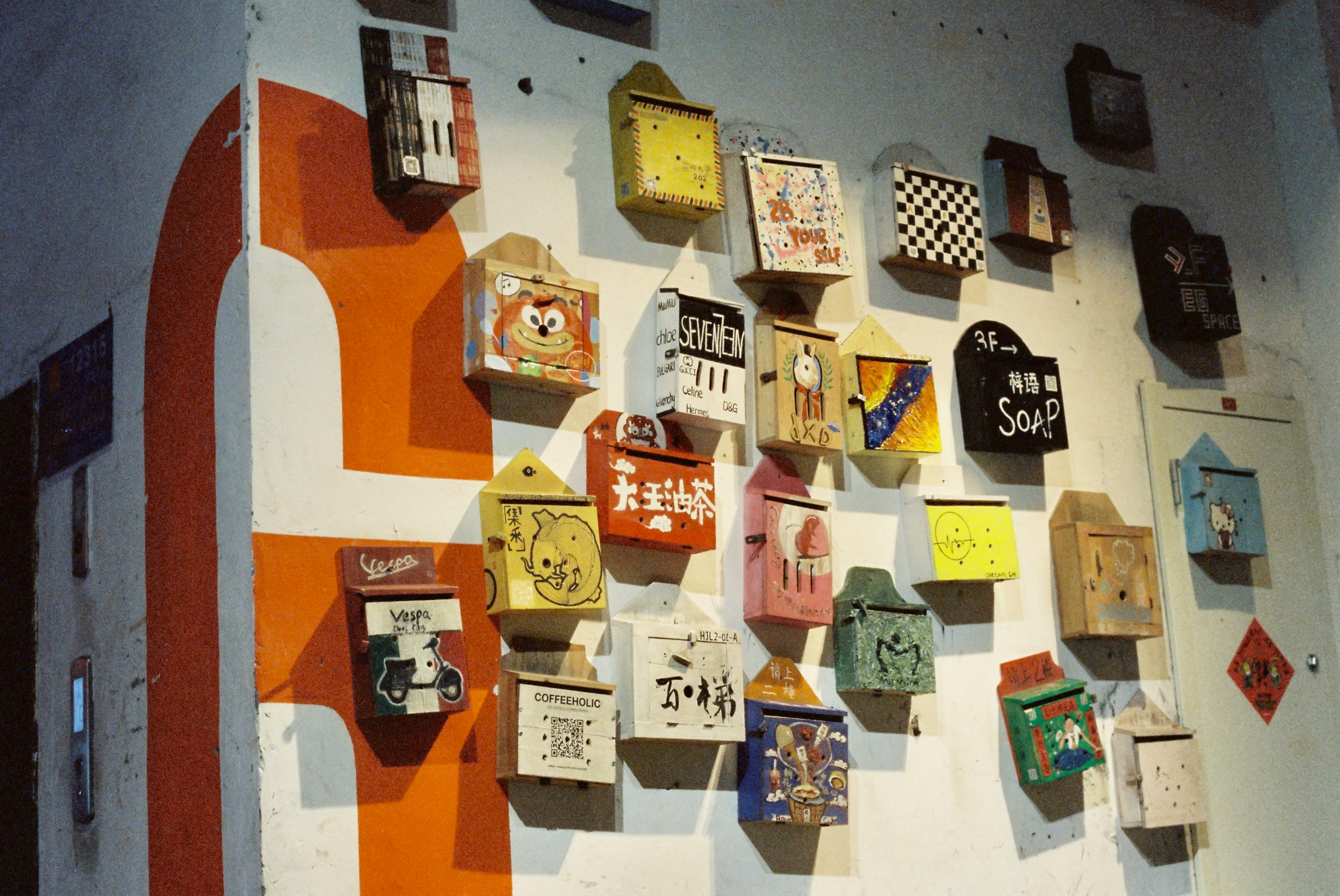 Colorful Boxes on Wall · Free Stock Photo