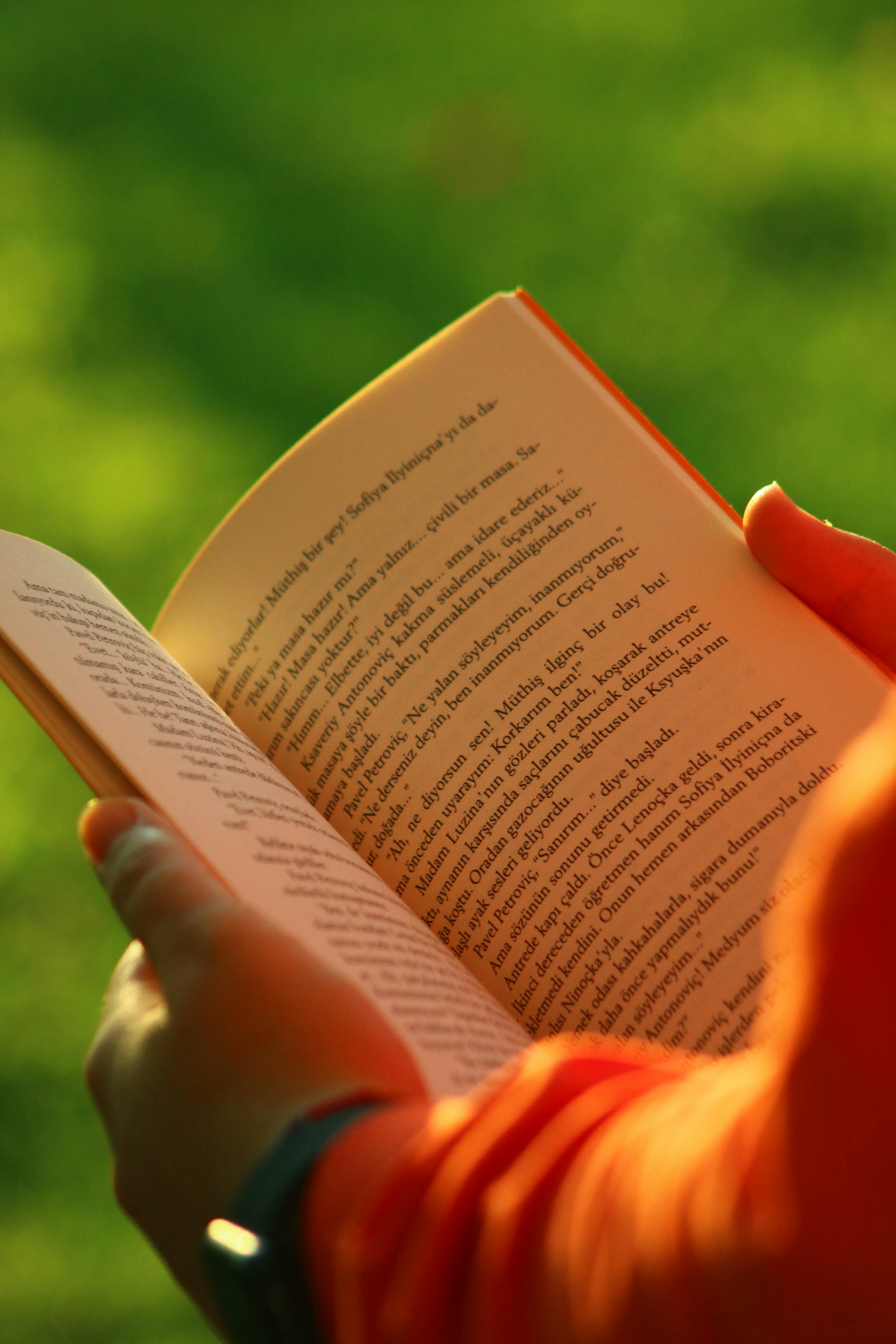 Low Light Photo of Opened Book · Free Stock Photo