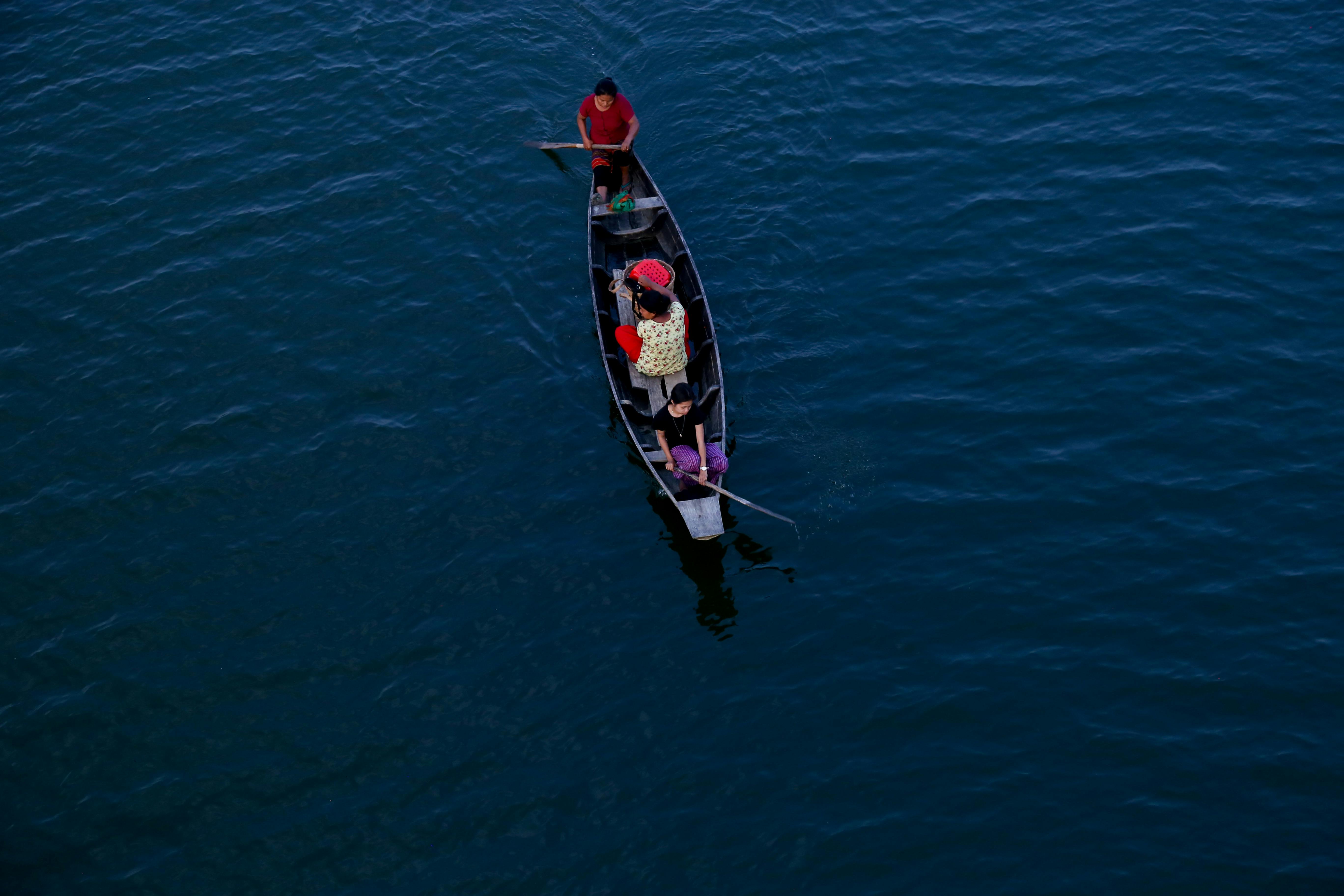 An Aerial Shot of People Riding Boats · Free Stock Photo