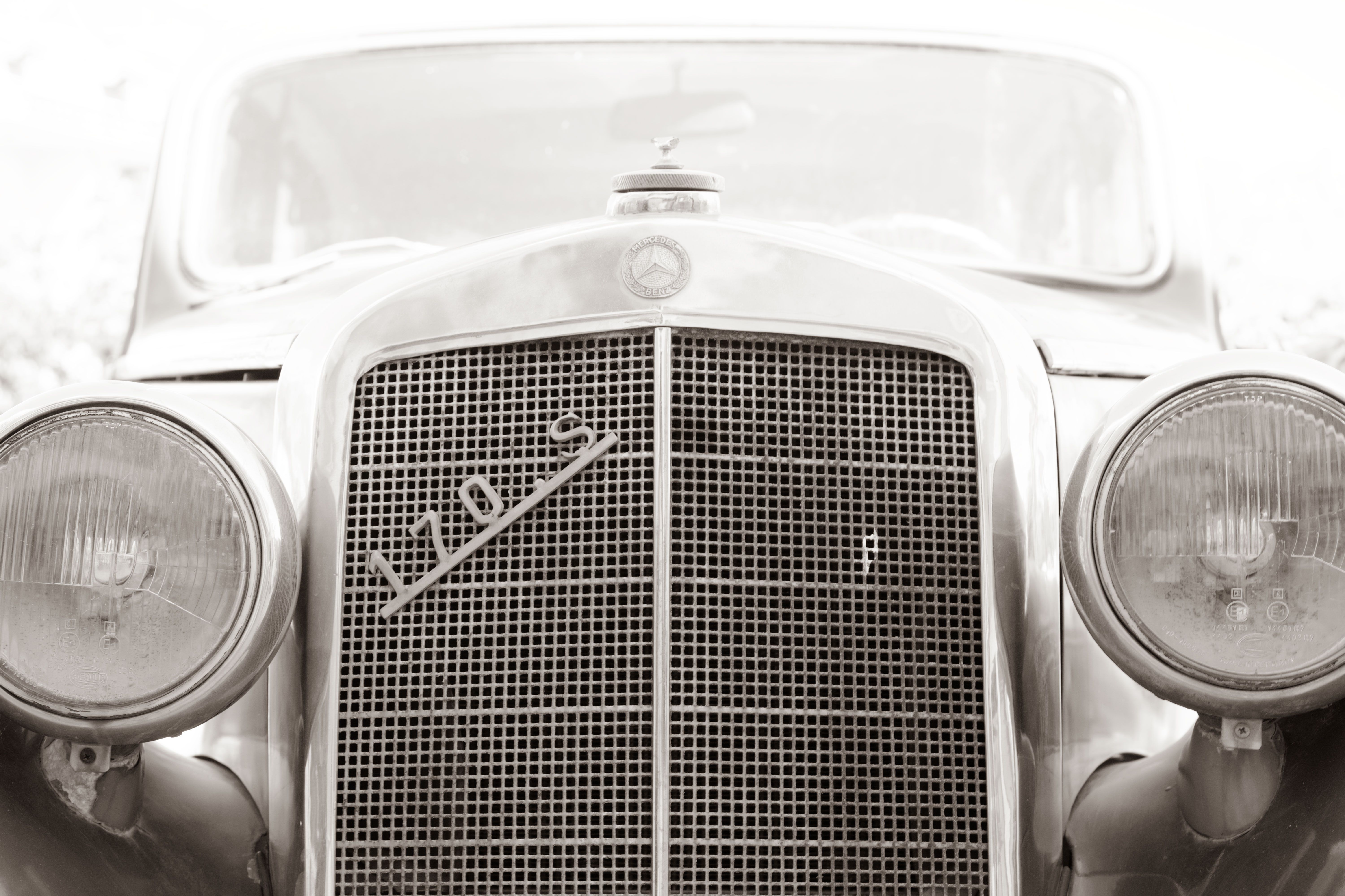 Grayscale Photography of an Old Classic Car · Free Stock Photo