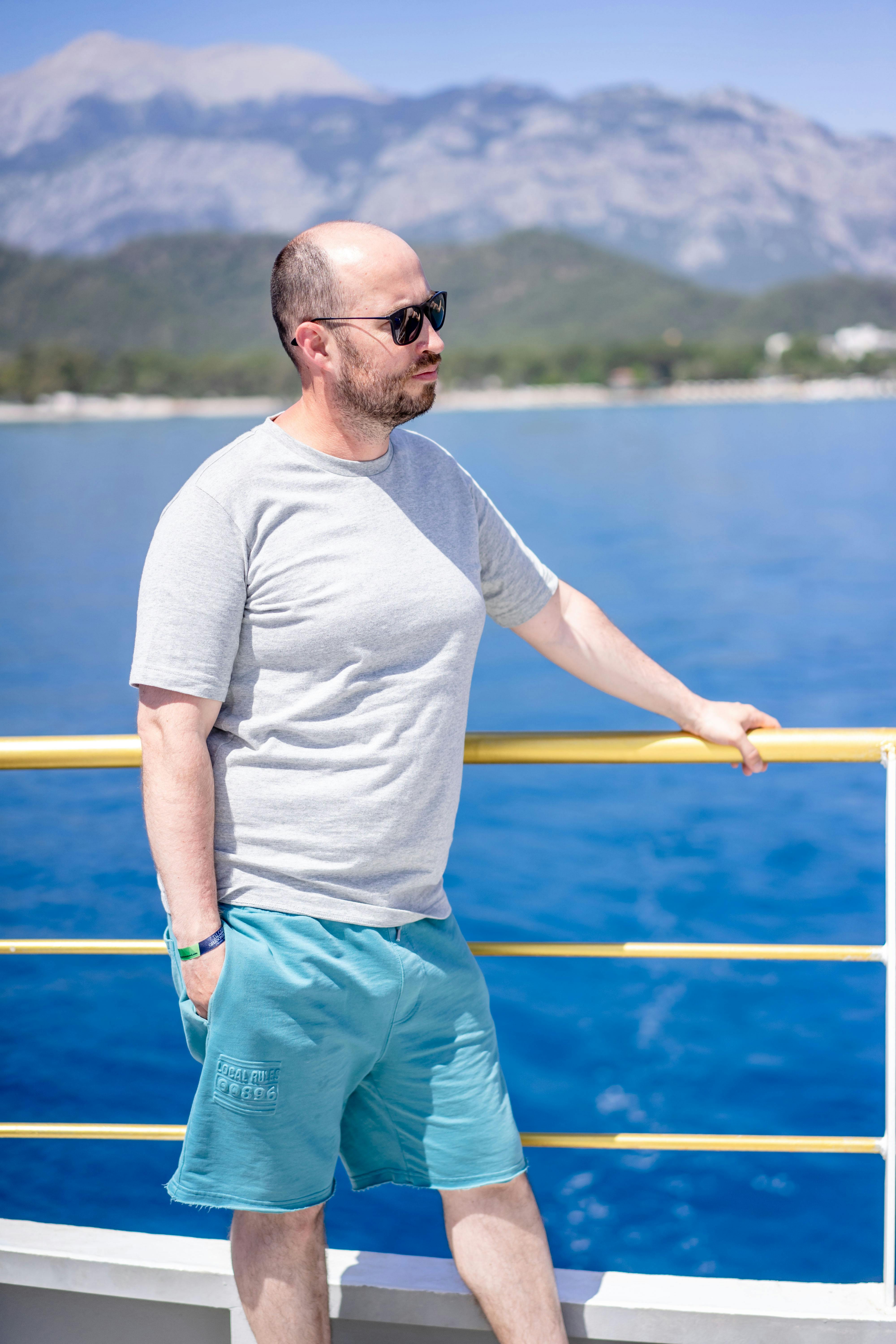 Couple Leaning Hand on Railing · Free Stock Photo