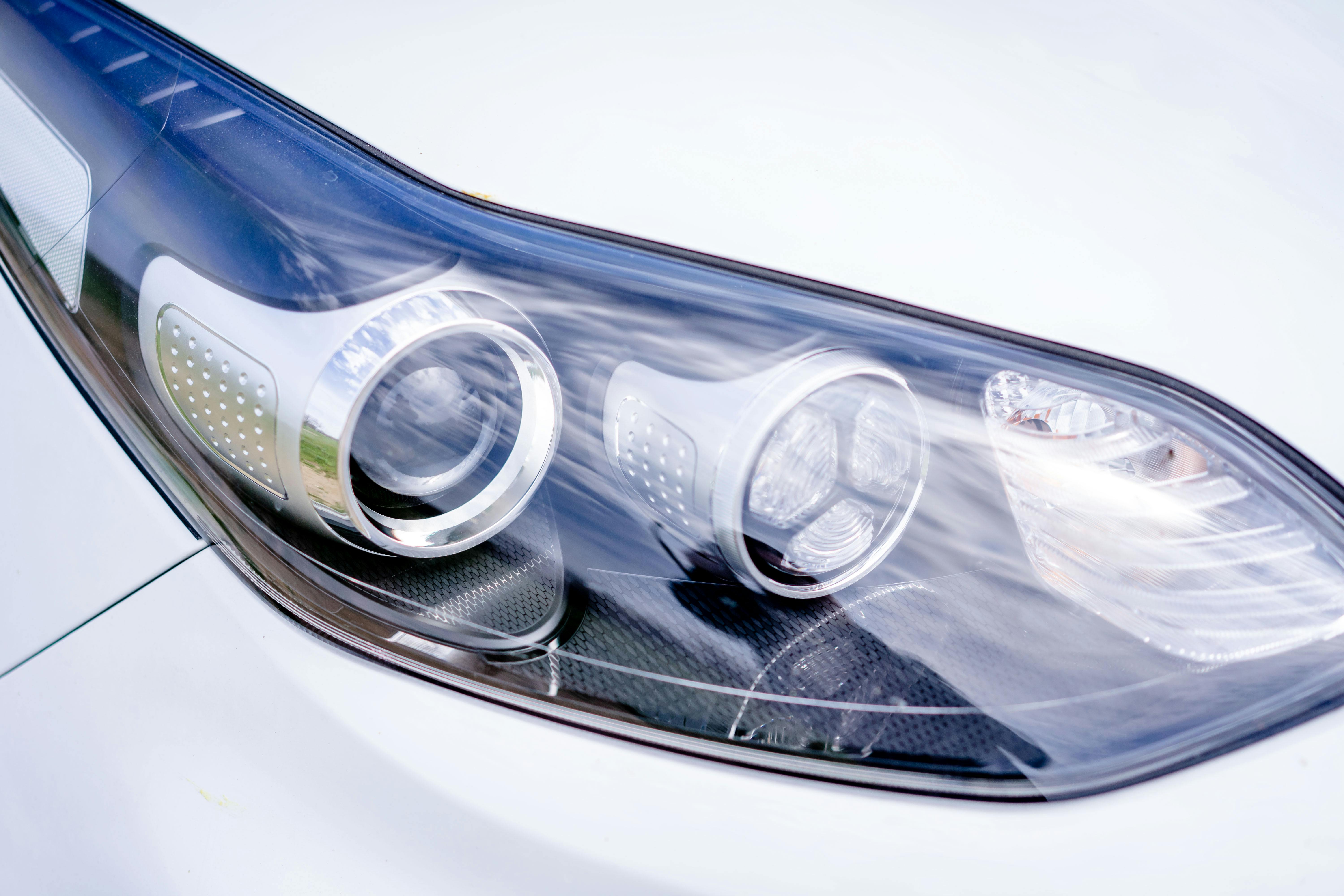 Close Up Photo of Car Headlight · Free Stock Photo
