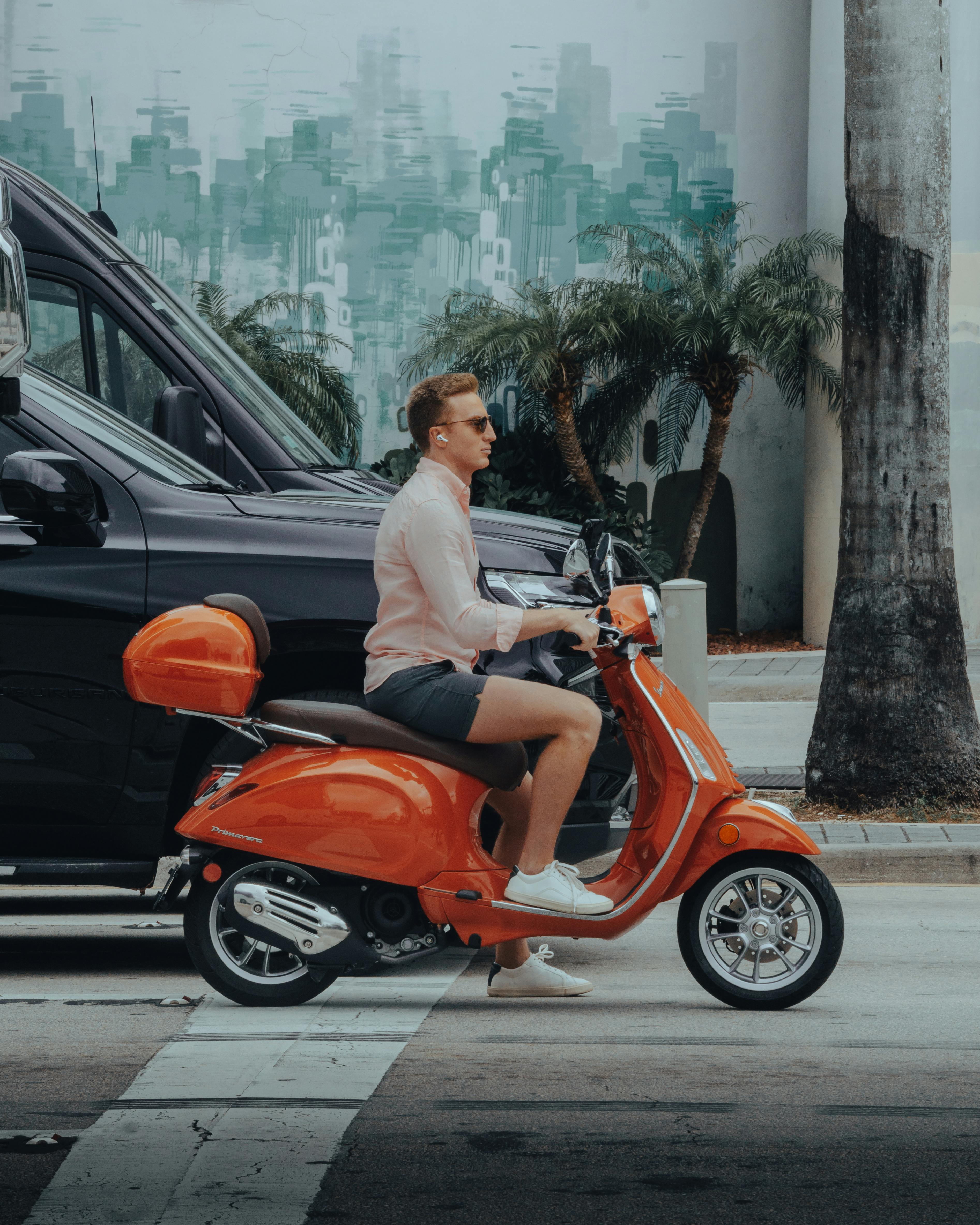 People Riding Motor Scooters in front of a Seafood Restaurant · Free ...