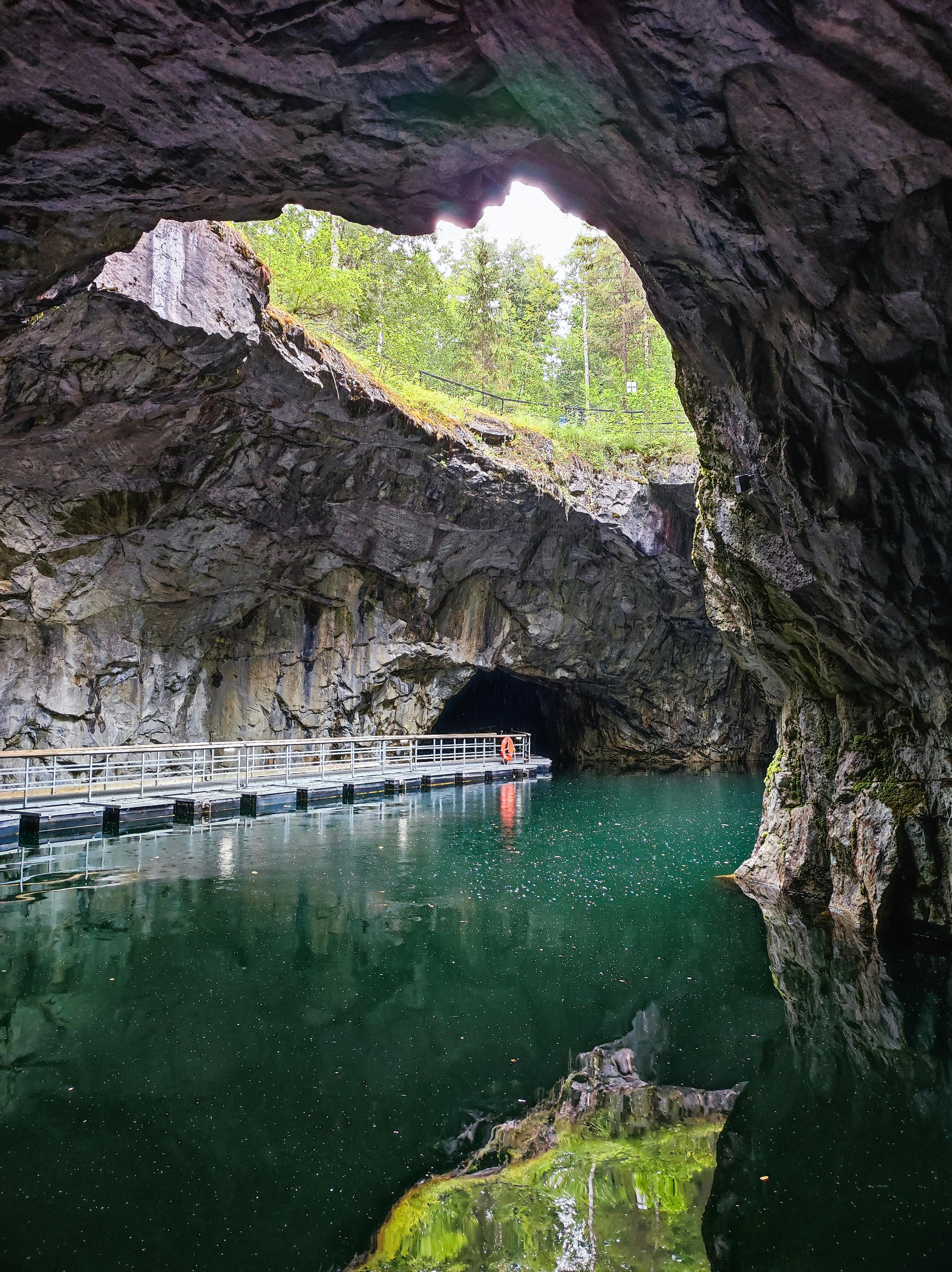 Underground Cave With Water At Bottom And Rock Crystals And Circular ...
