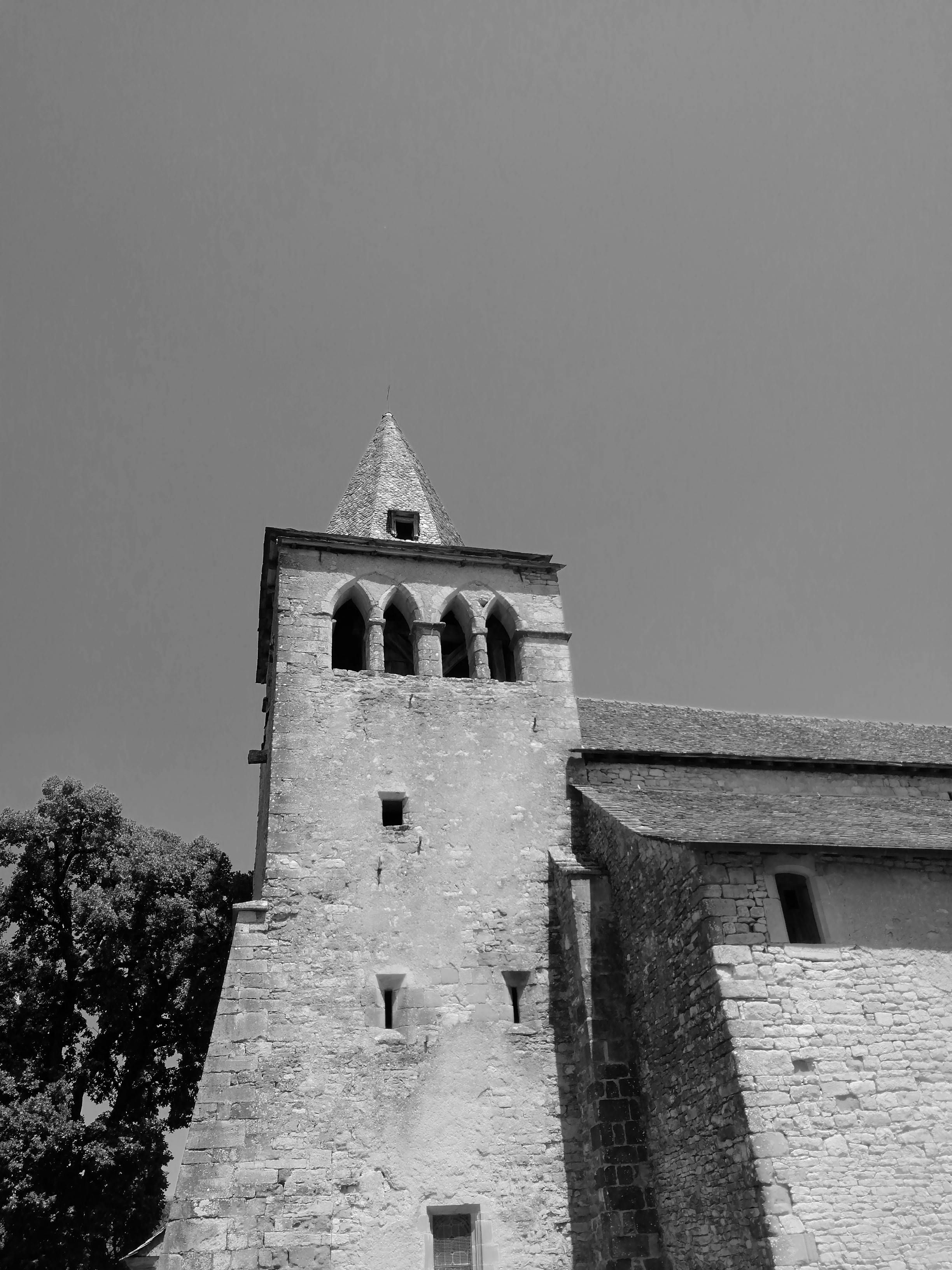 Grayscale Photo of Brick Building · Free Stock Photo