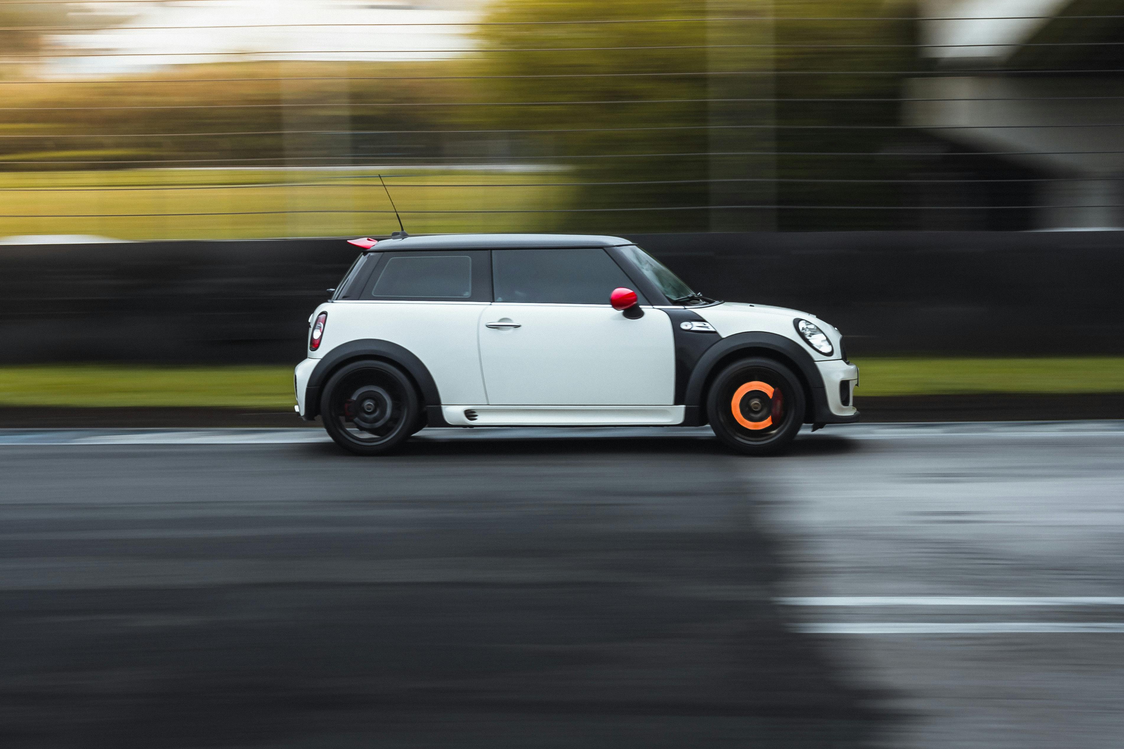 Mini Cooper Moving Fast · Free Stock Photo