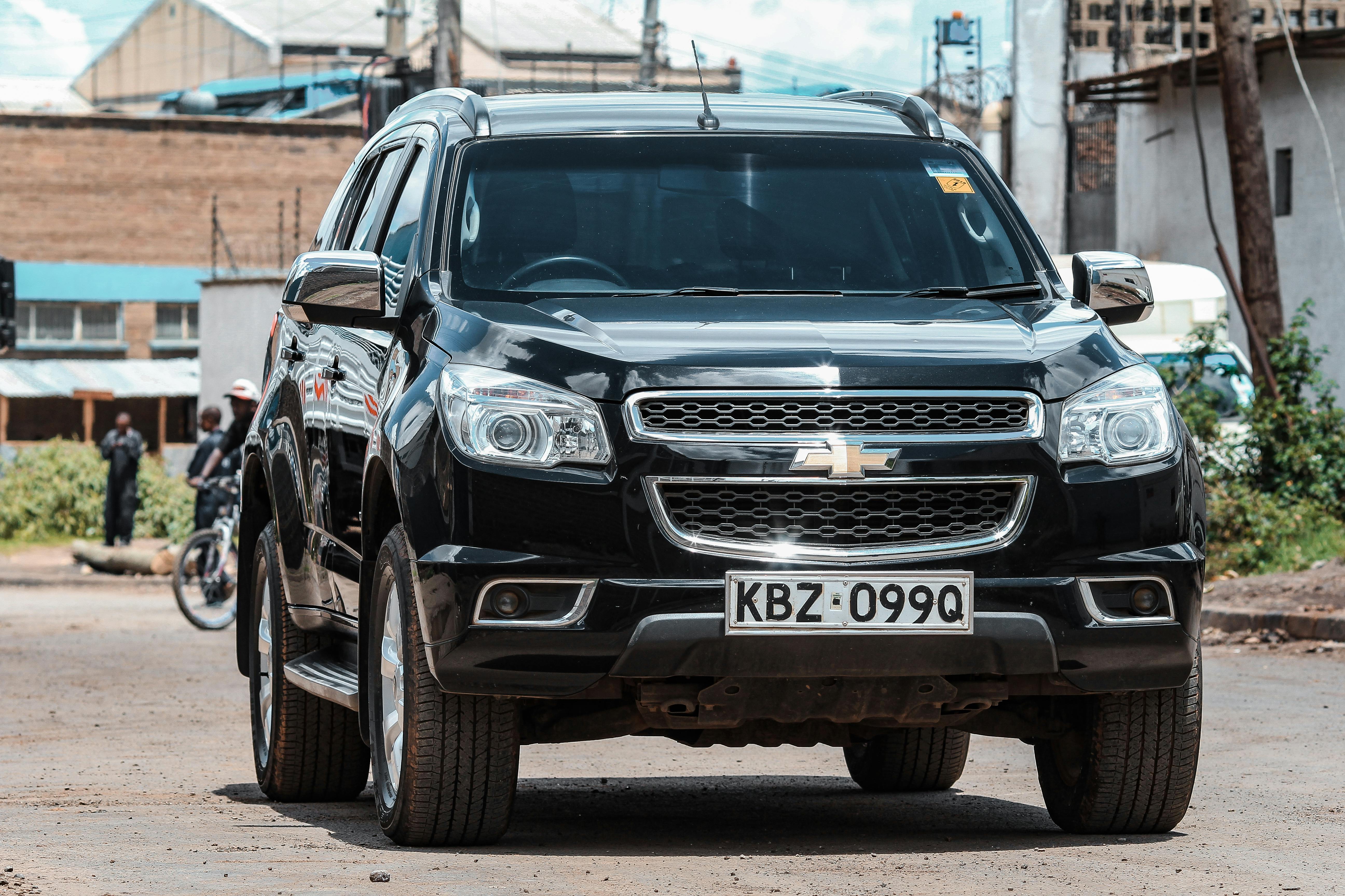 A Man Riding Chevrolet Camaro · Free Stock Photo