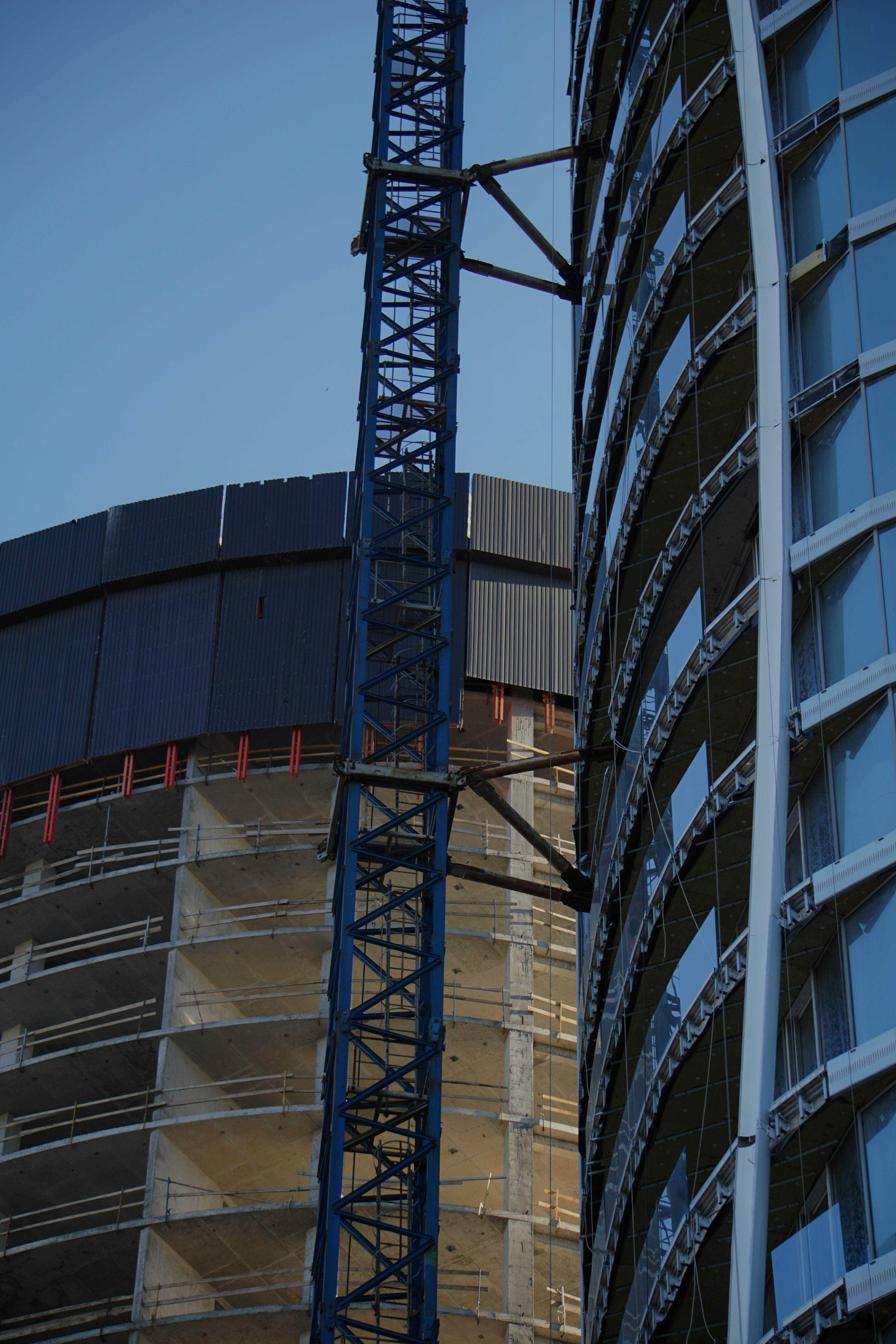Metal Scaffolding Attached to a Building Tower · Free Stock Photo