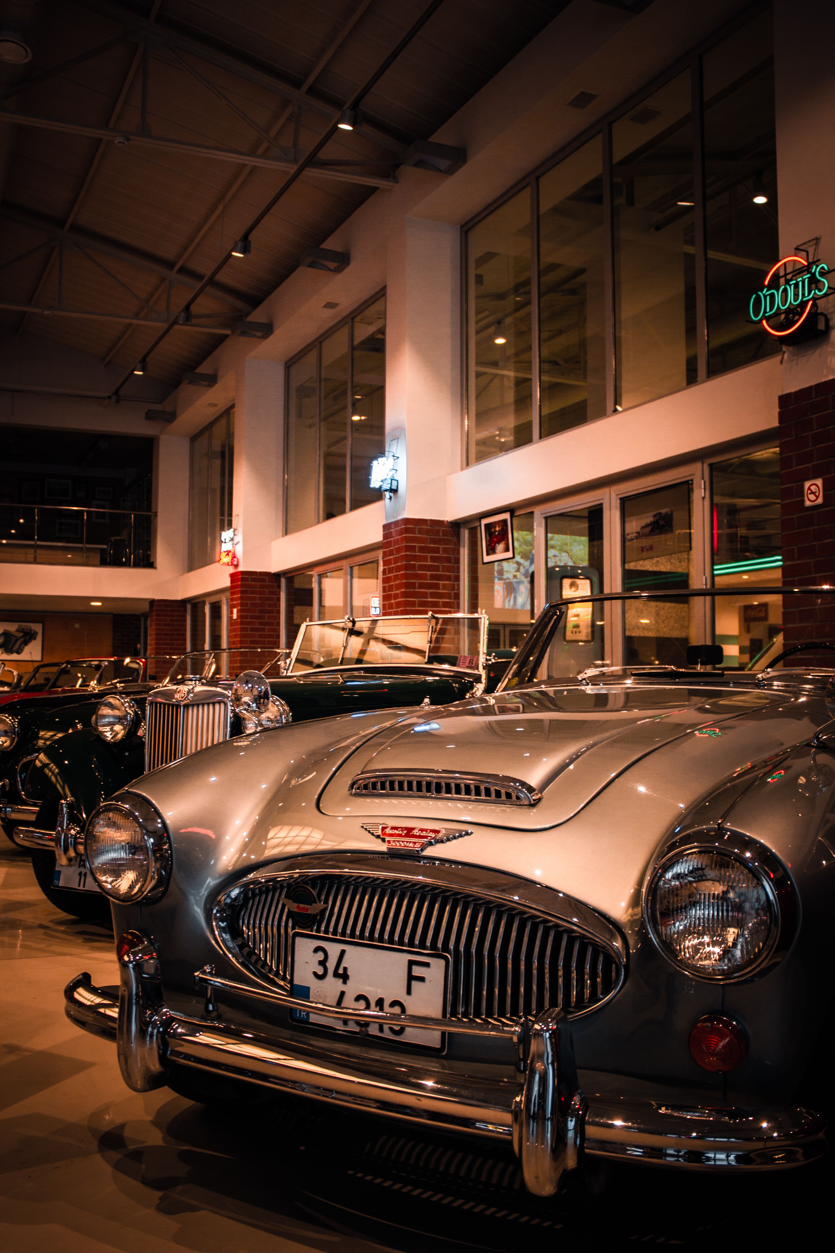 Silver Car Parked inside the Museum · Free Stock Photo