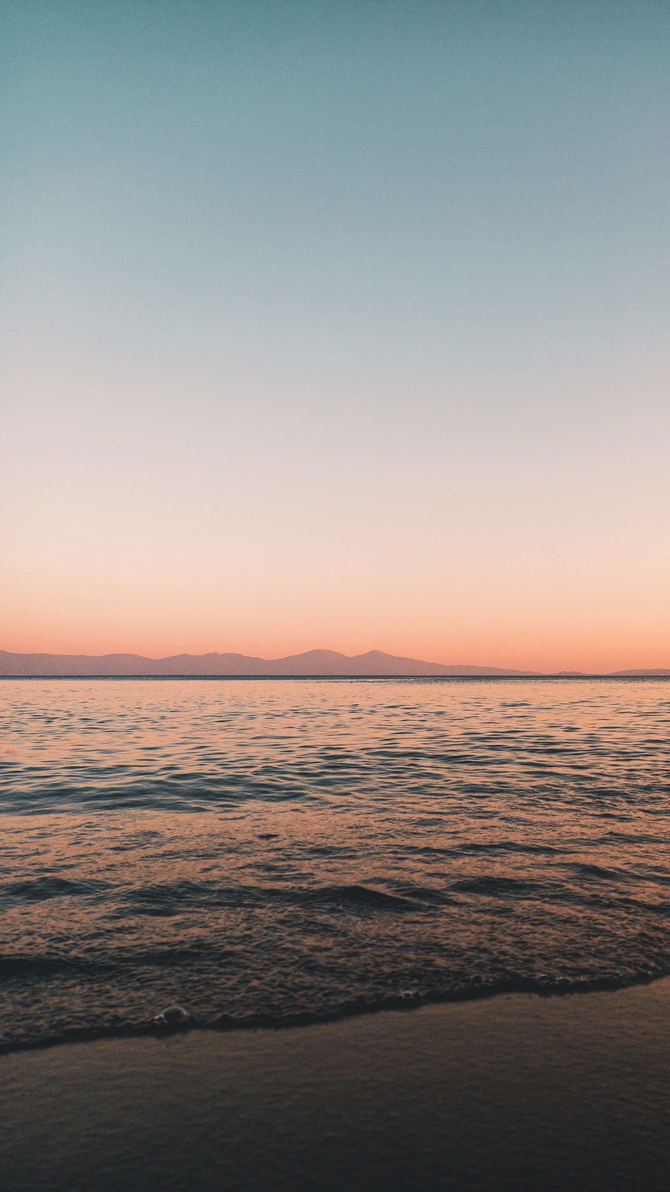 Brown and Black Rock Formations With Fog during Sunset · Free Stock Photo