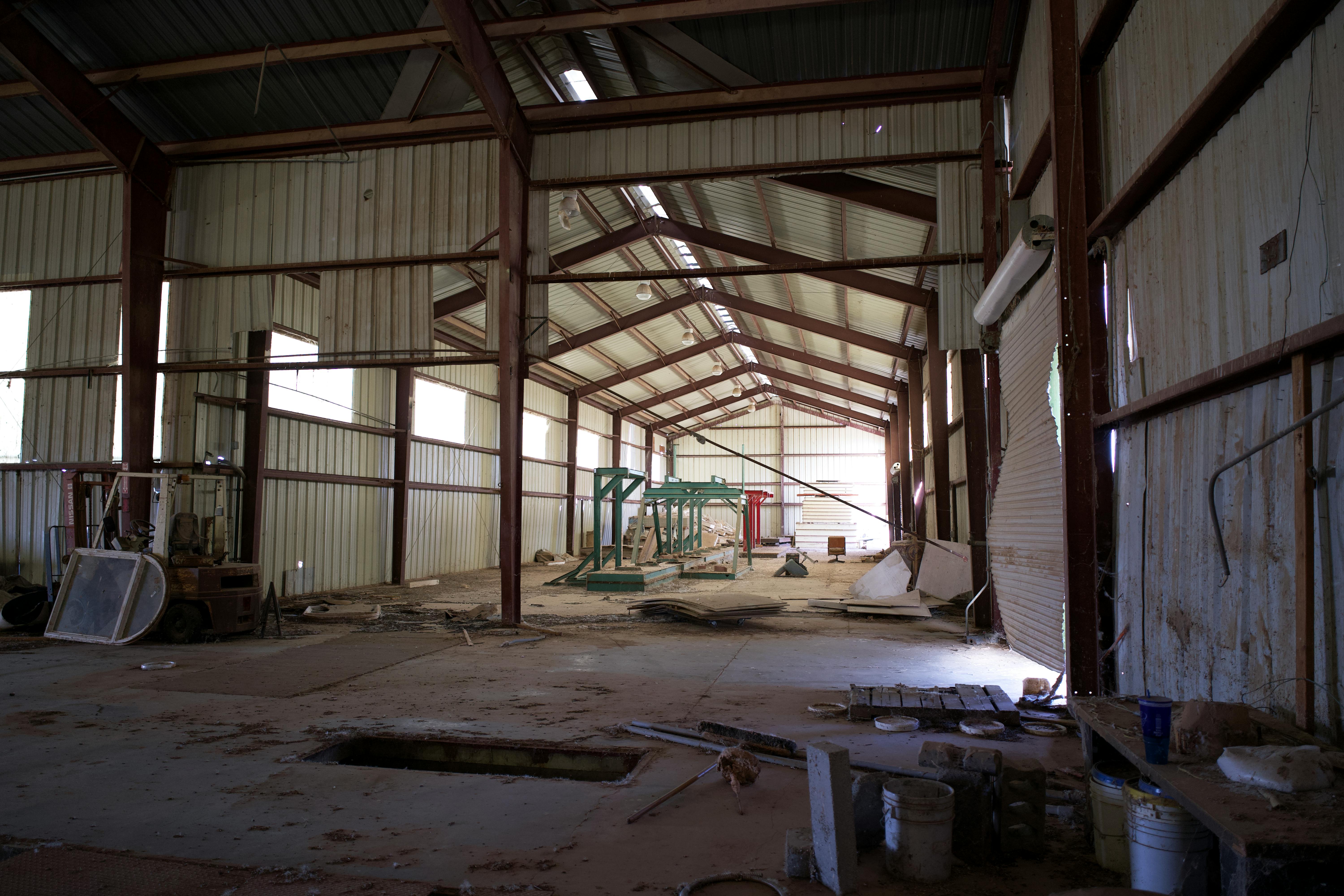 Interior of an Abandoned Warehouse · Free Stock Photo