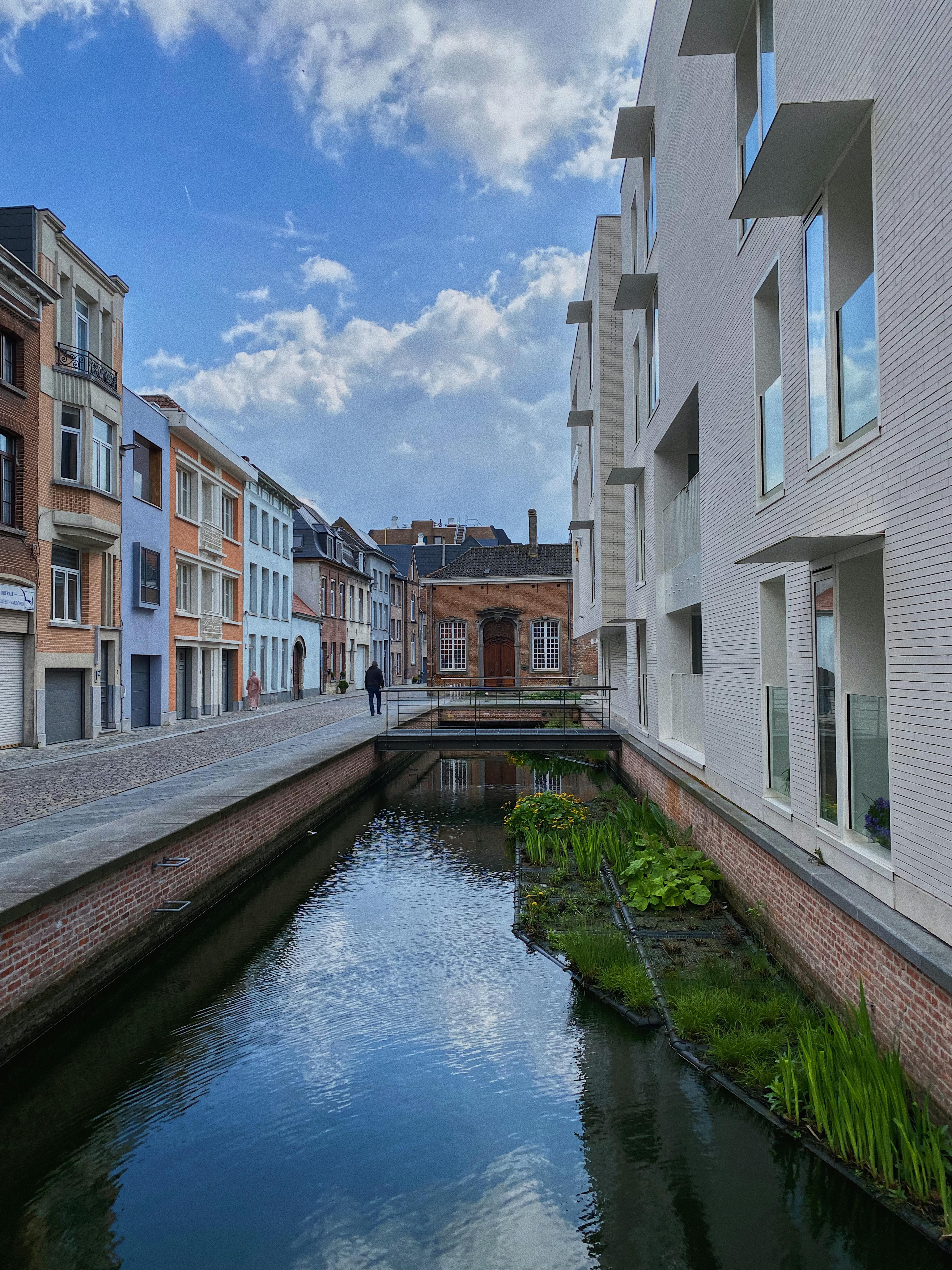 Canal in Between Buildings · Free Stock Photo