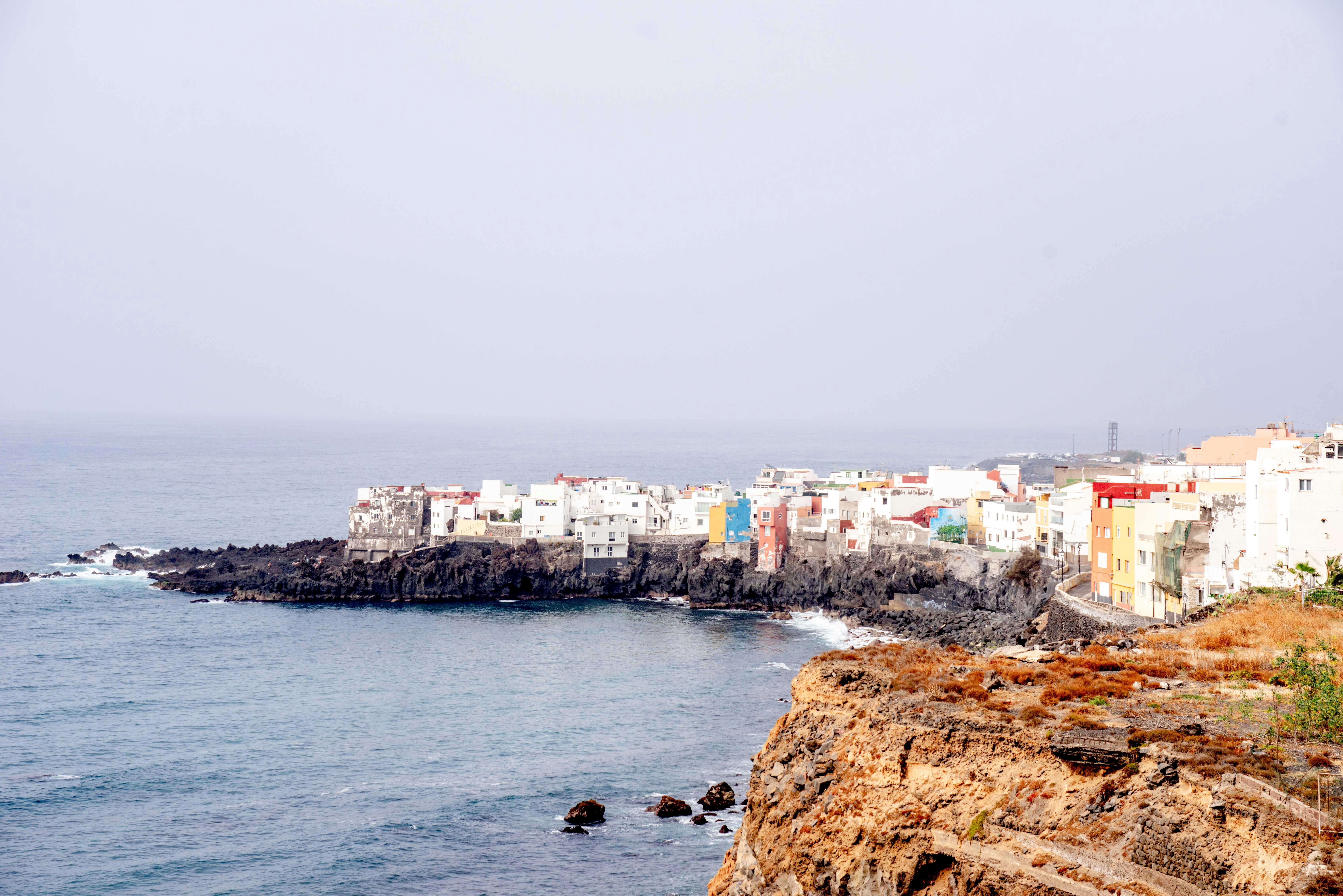 City Buildings Near the Ocean · Free Stock Photo