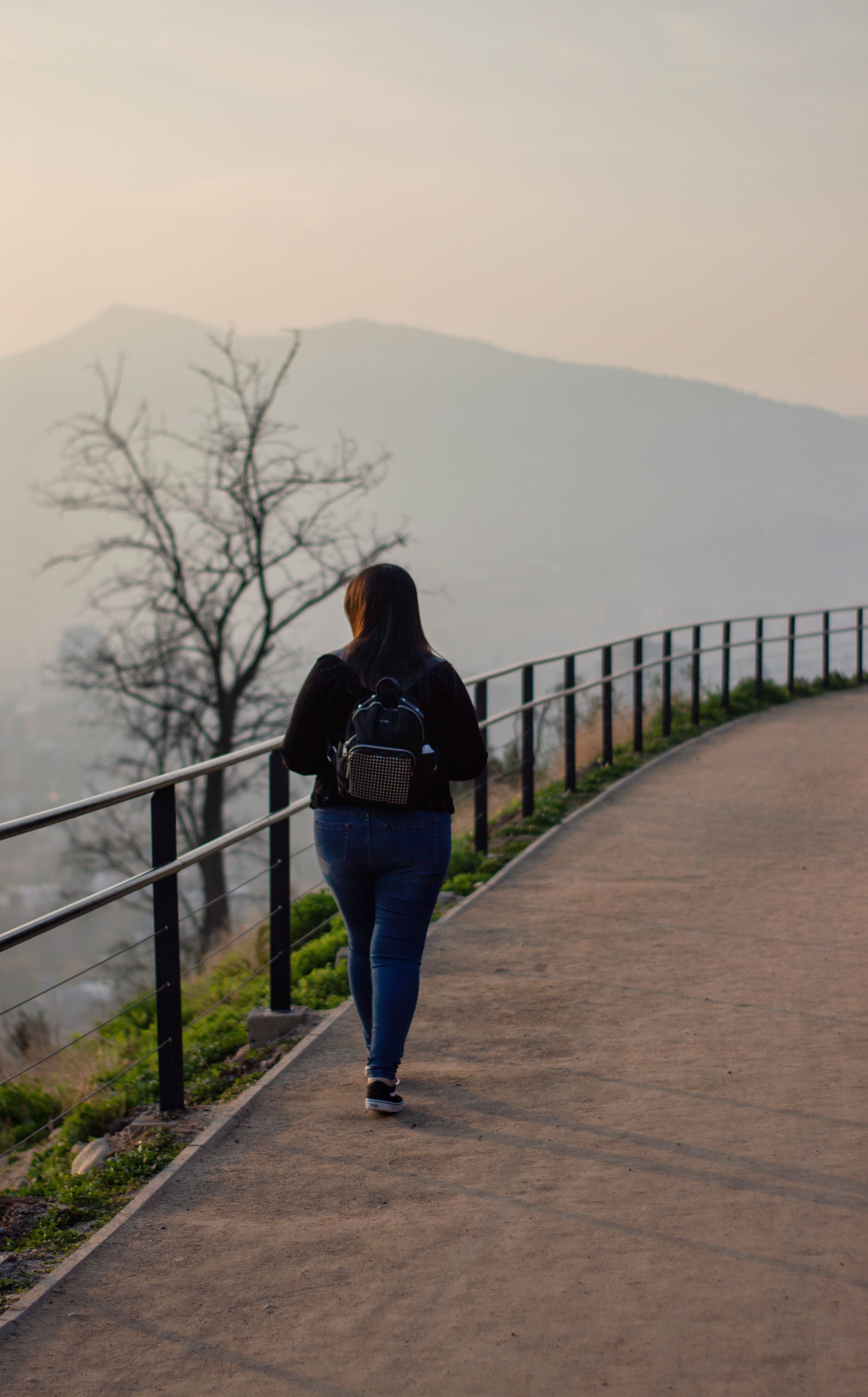 Woman Walking on Pathway · Free Stock Photo