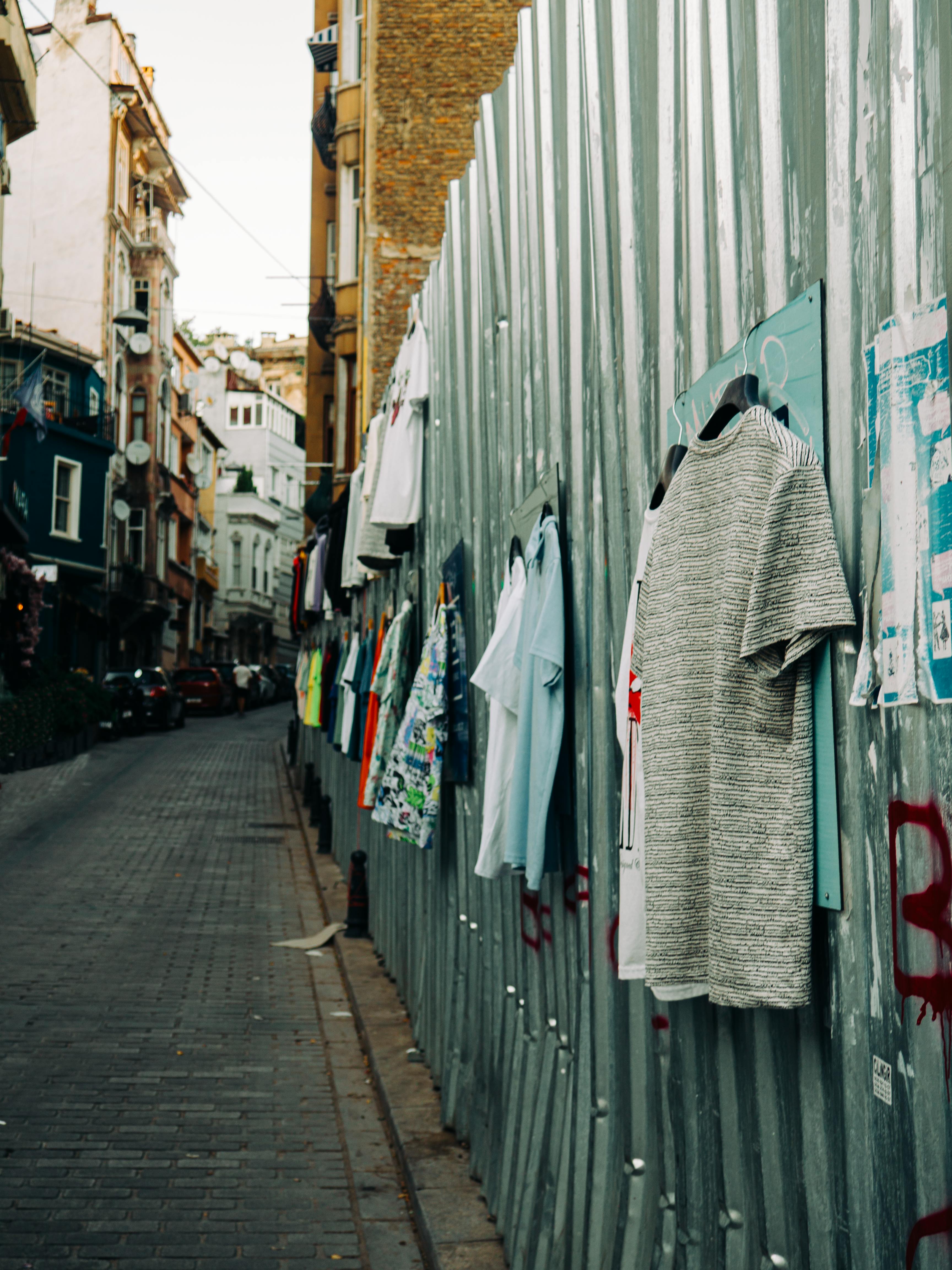 Clothes Hanging on the Wall · Free Stock Photo